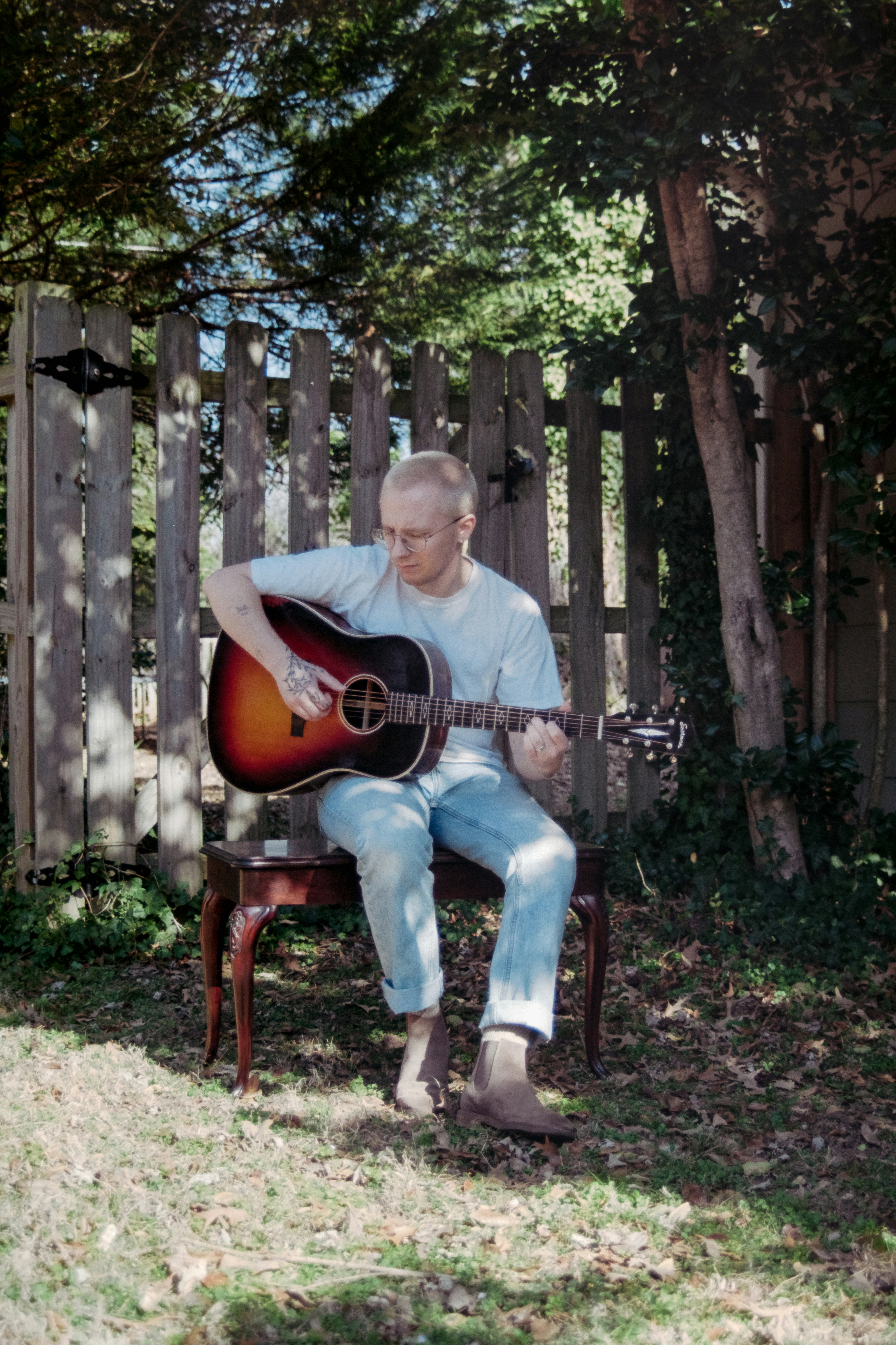 Acoustic Solace: Solo Guitar in a Sunlit Yard