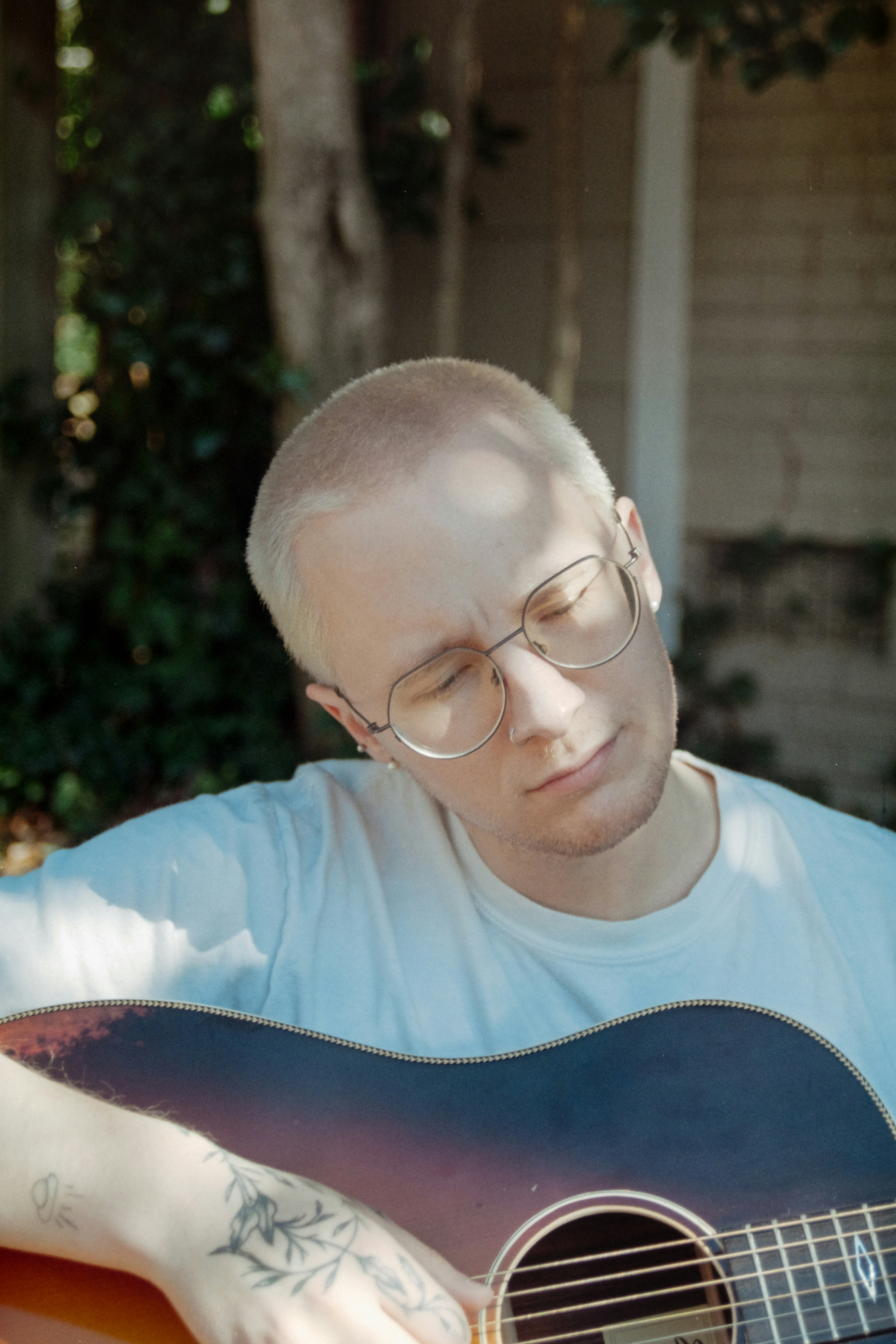 Quiet Strings: A Moment of Focus in Soft Sunlight