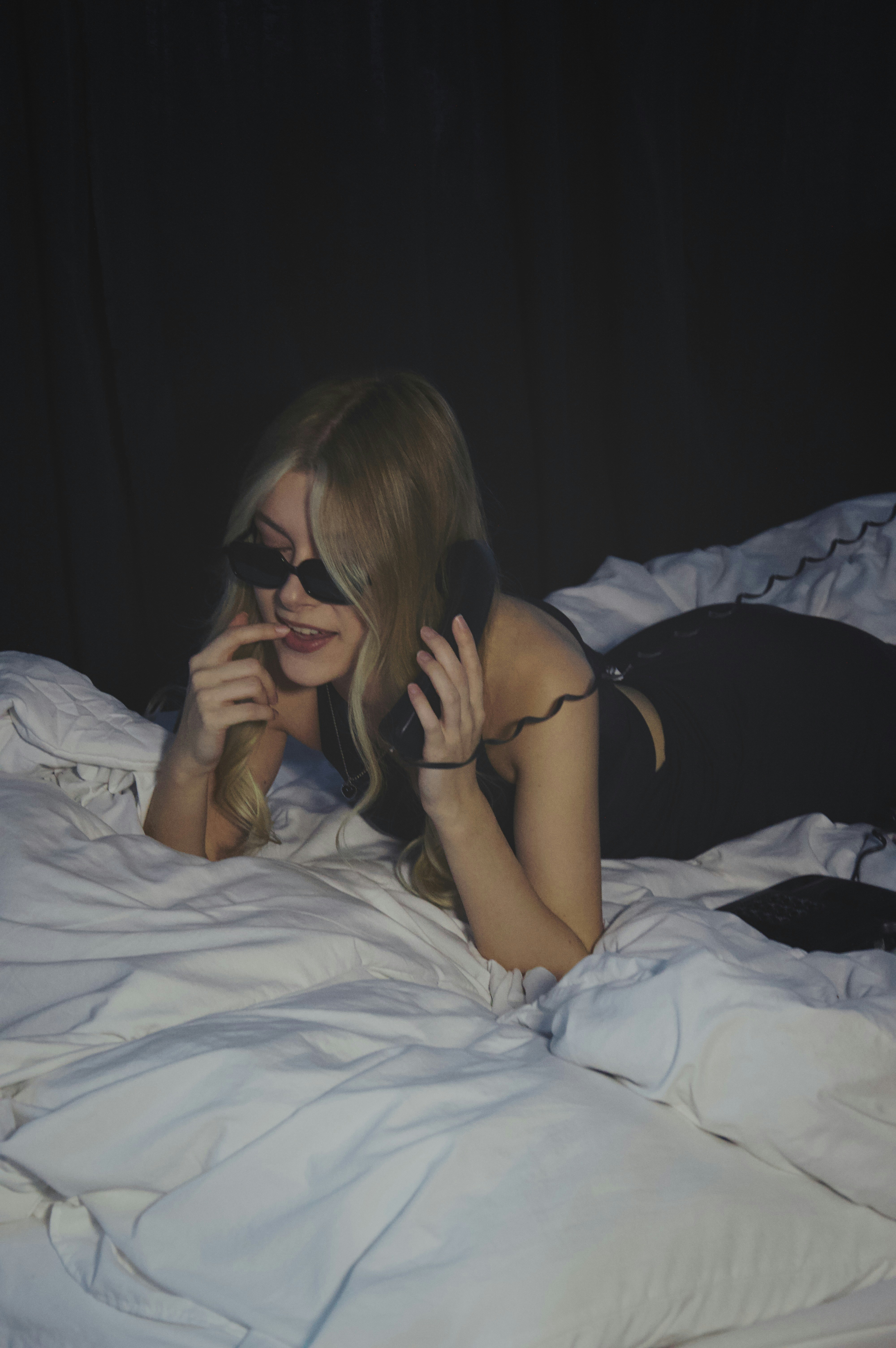 Midnight Rendezvous: A Velvet Night on White Sheets