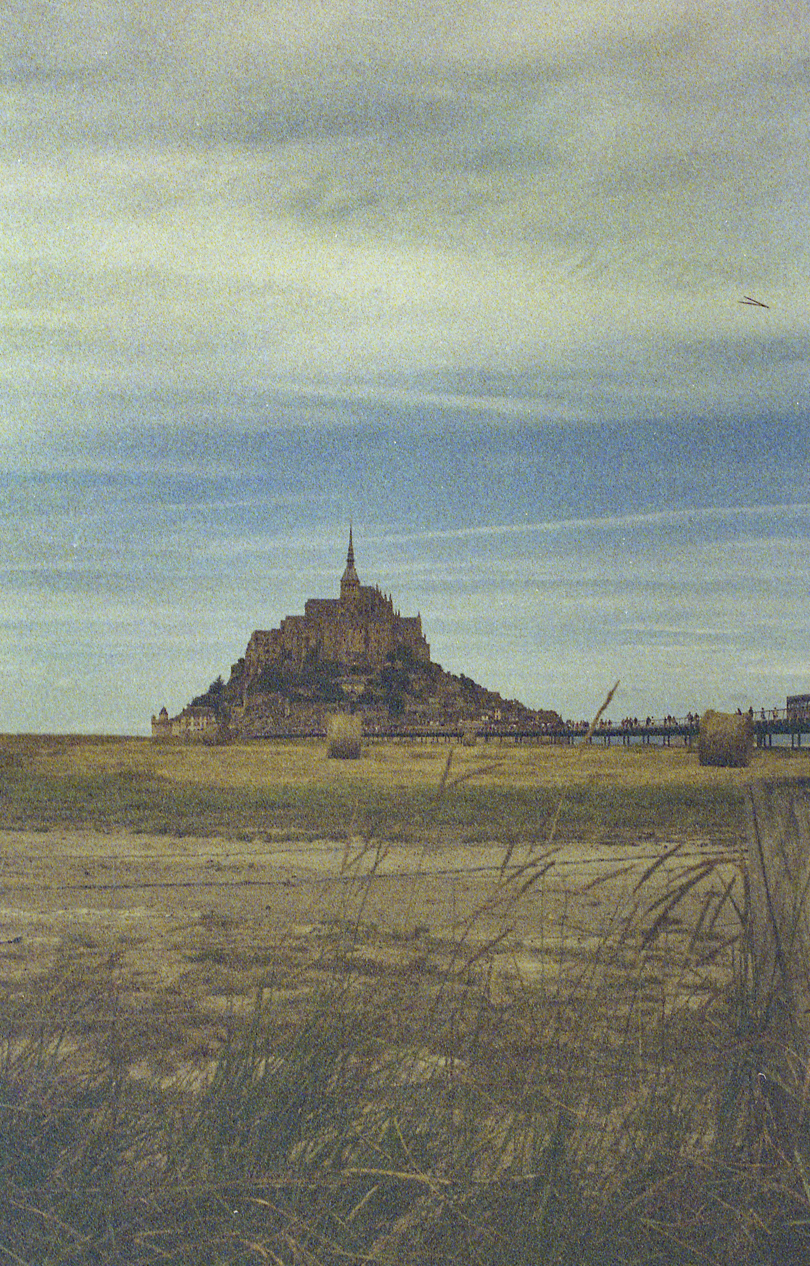 Mont saint-michel castle on a hill under cloudy sky