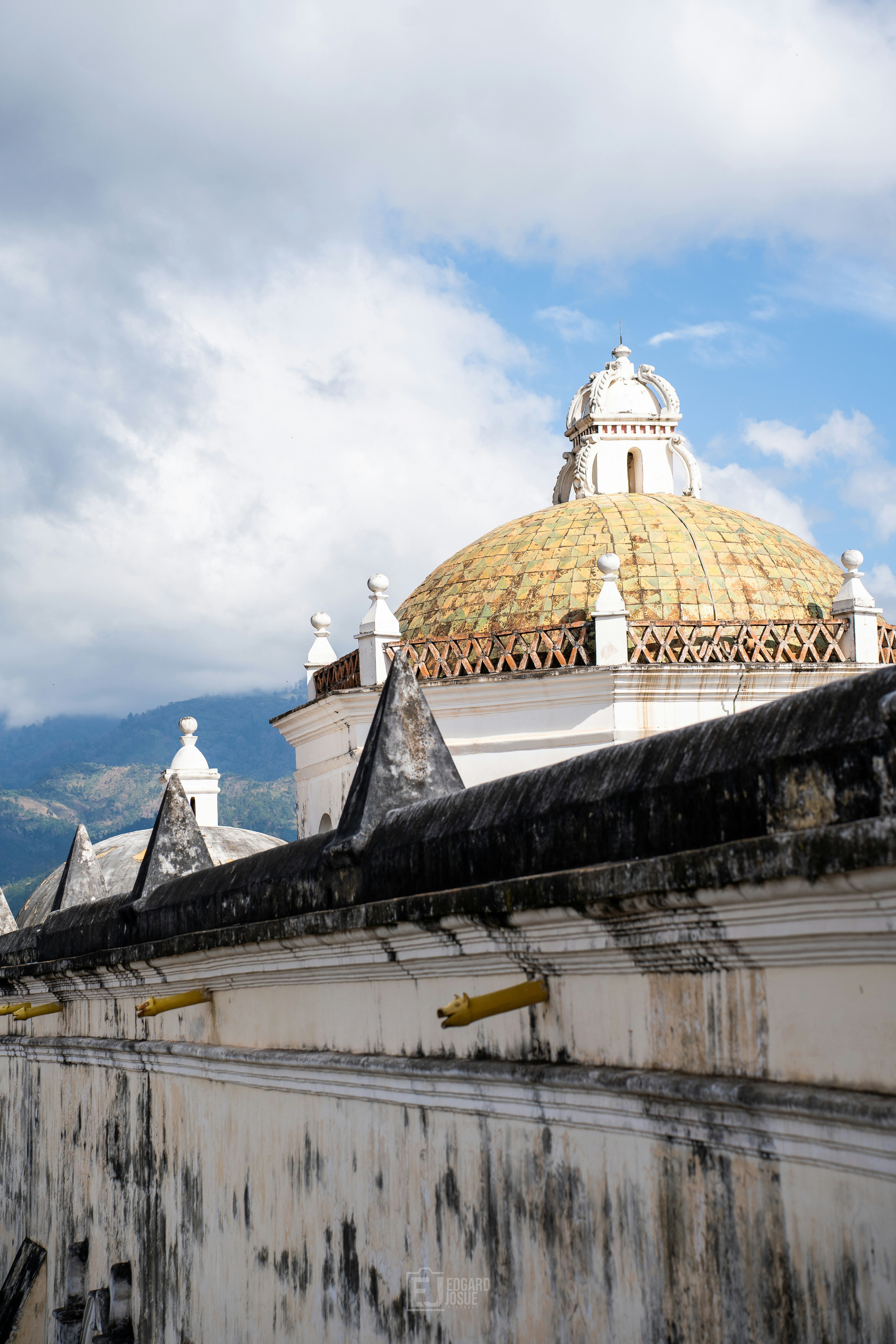 Dome of History: Sunlit Architecture Surrounded by Weathered Parapets