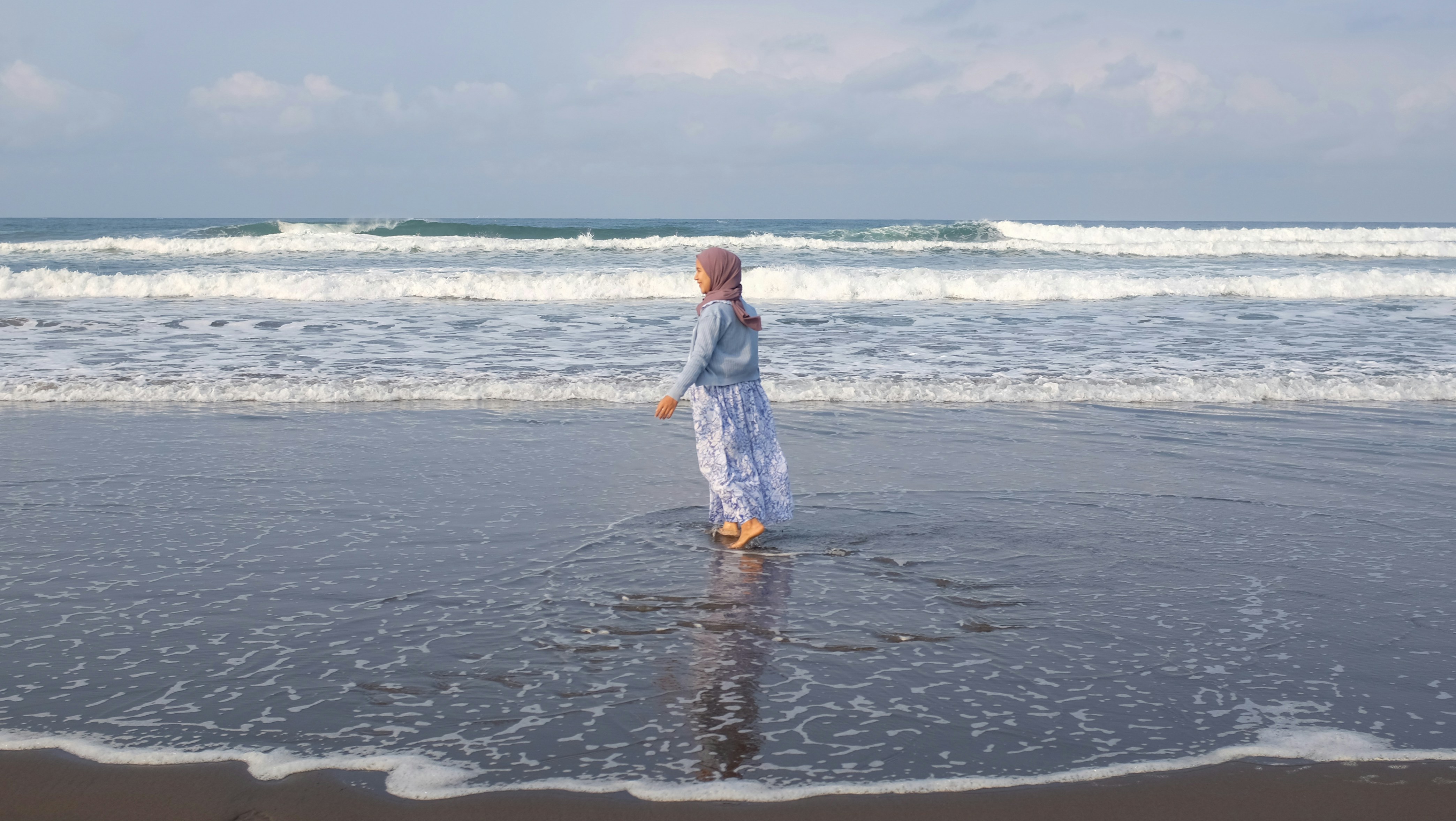 Child at the Tidal Edge: A Quiet Moment on the Shore