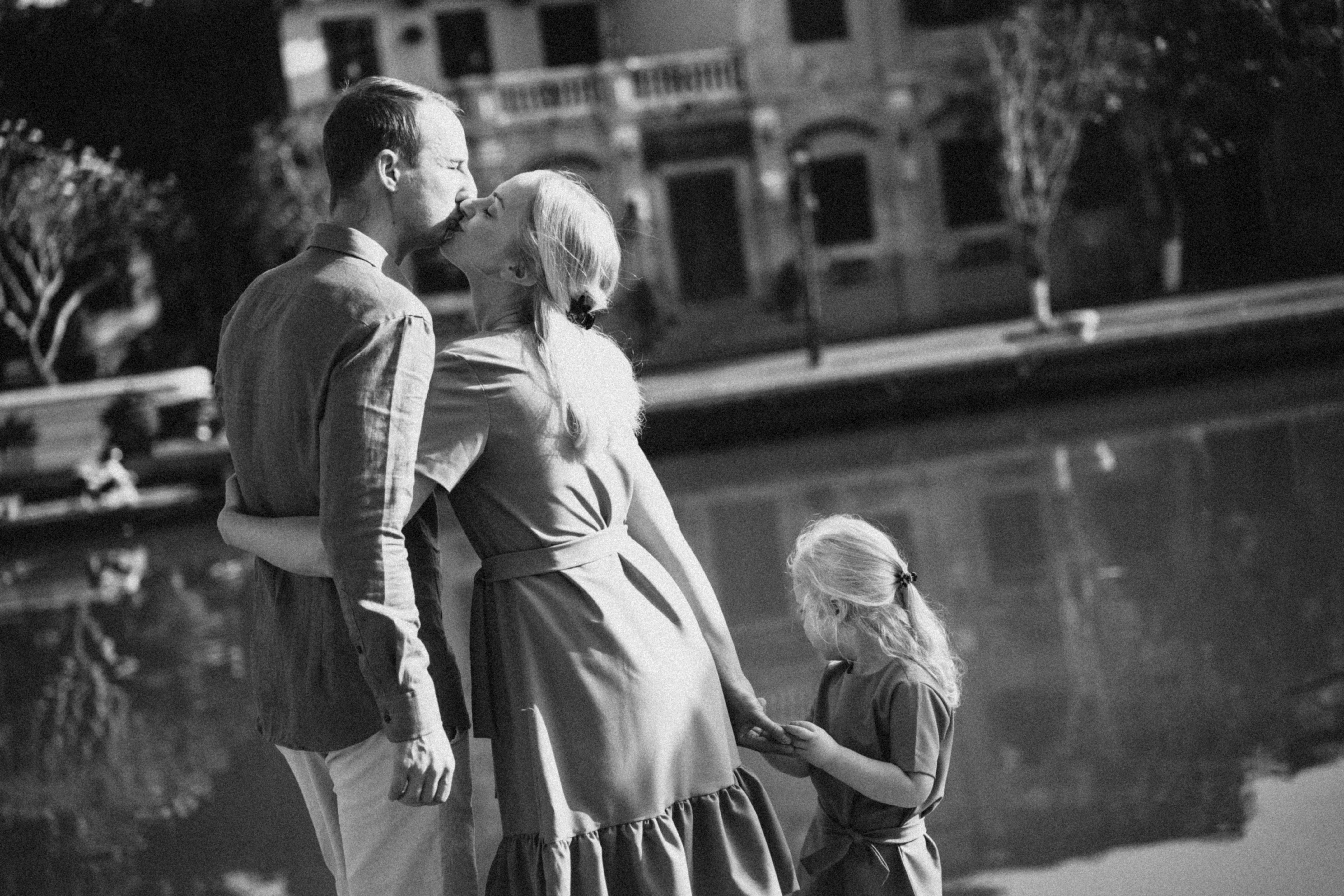 Kiss by the Canal: A Family Moment in Mono