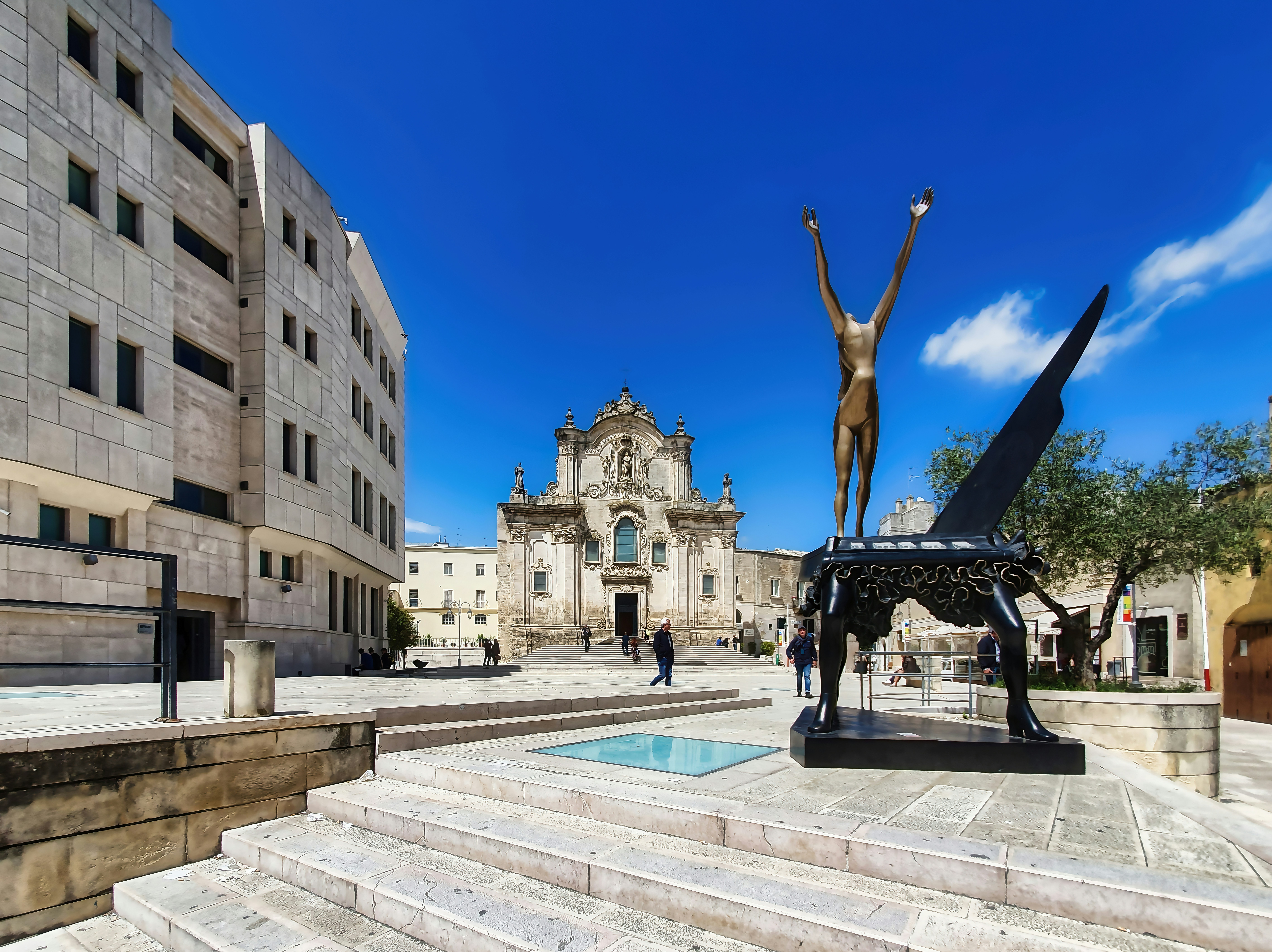 Sculpted Leap Over Stone: A Plaza of Contrast