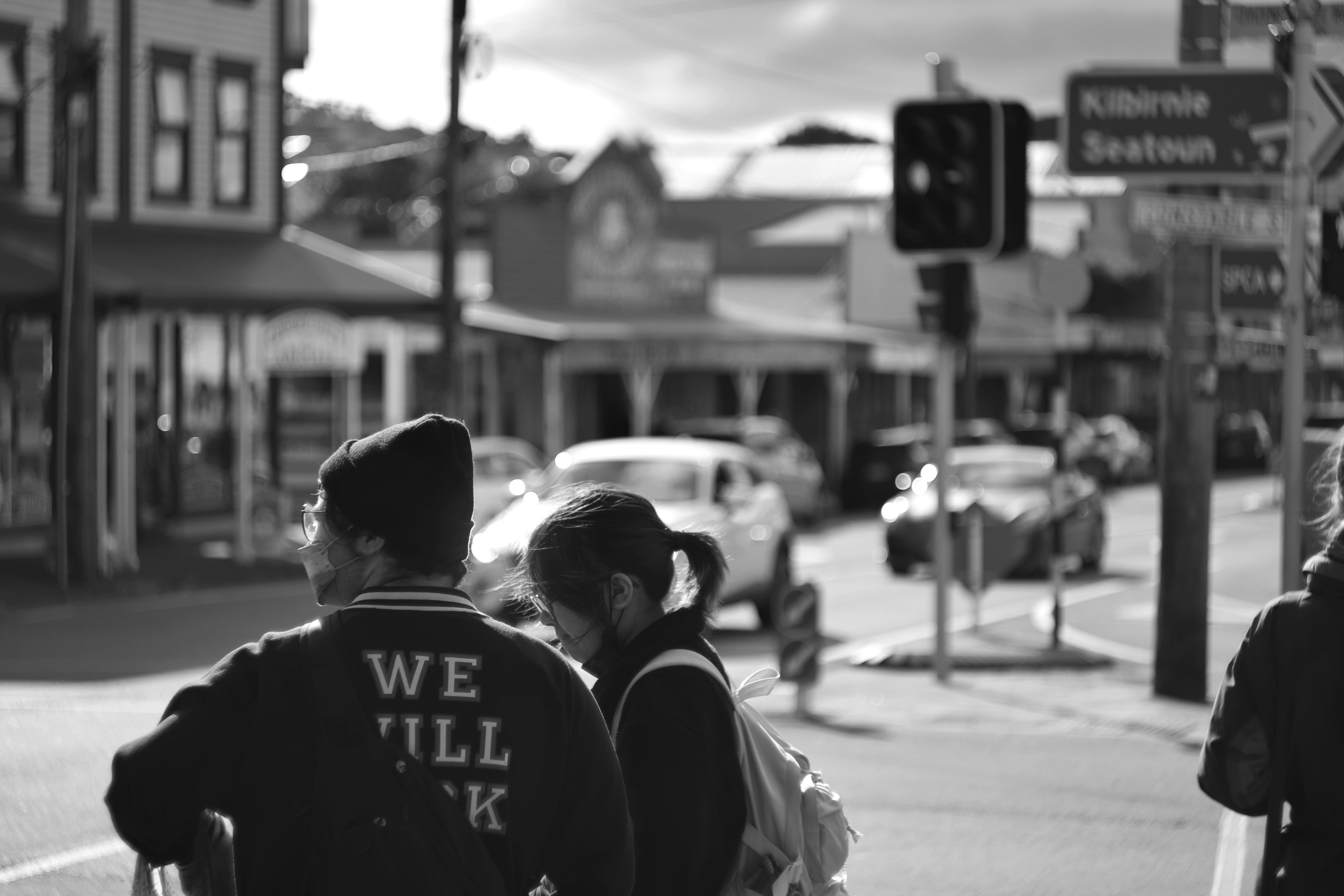 City Crosswalk Echo: People in Motion at a Quiet Intersection