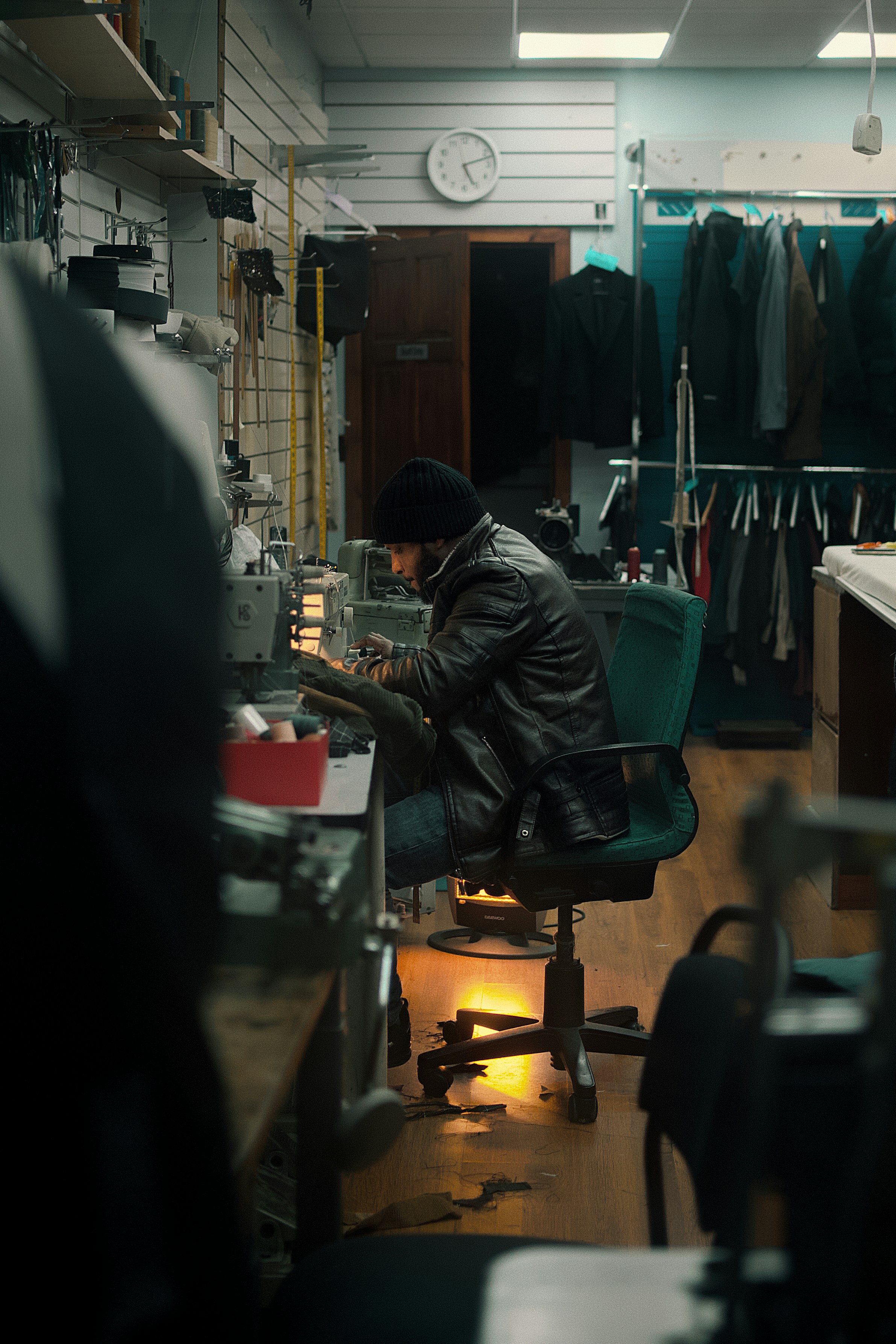A Tailor at Work: Quiet Focus in a Backroom Studio