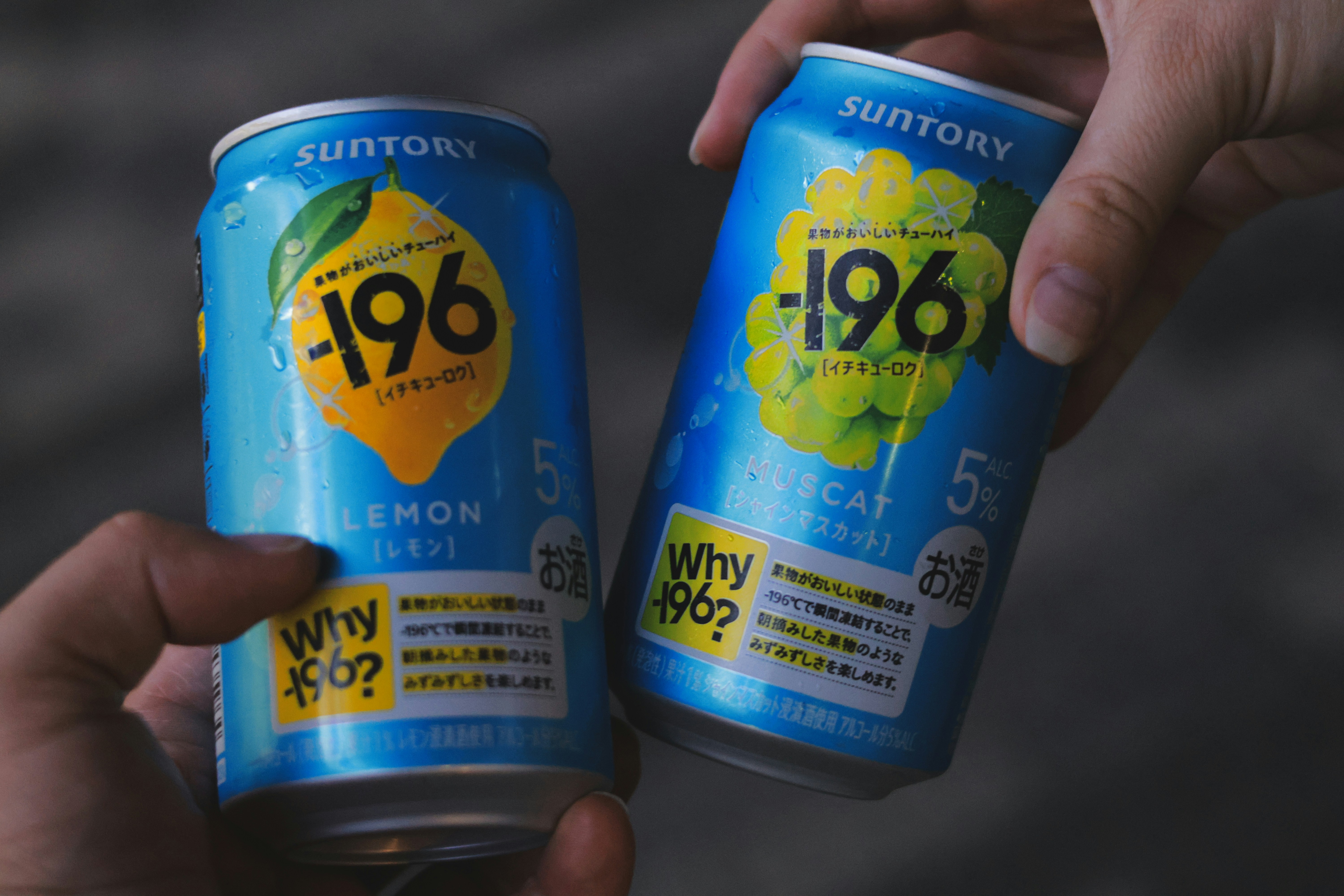 Two Blue Citrus Cans Meet in a Hands-On Exchange