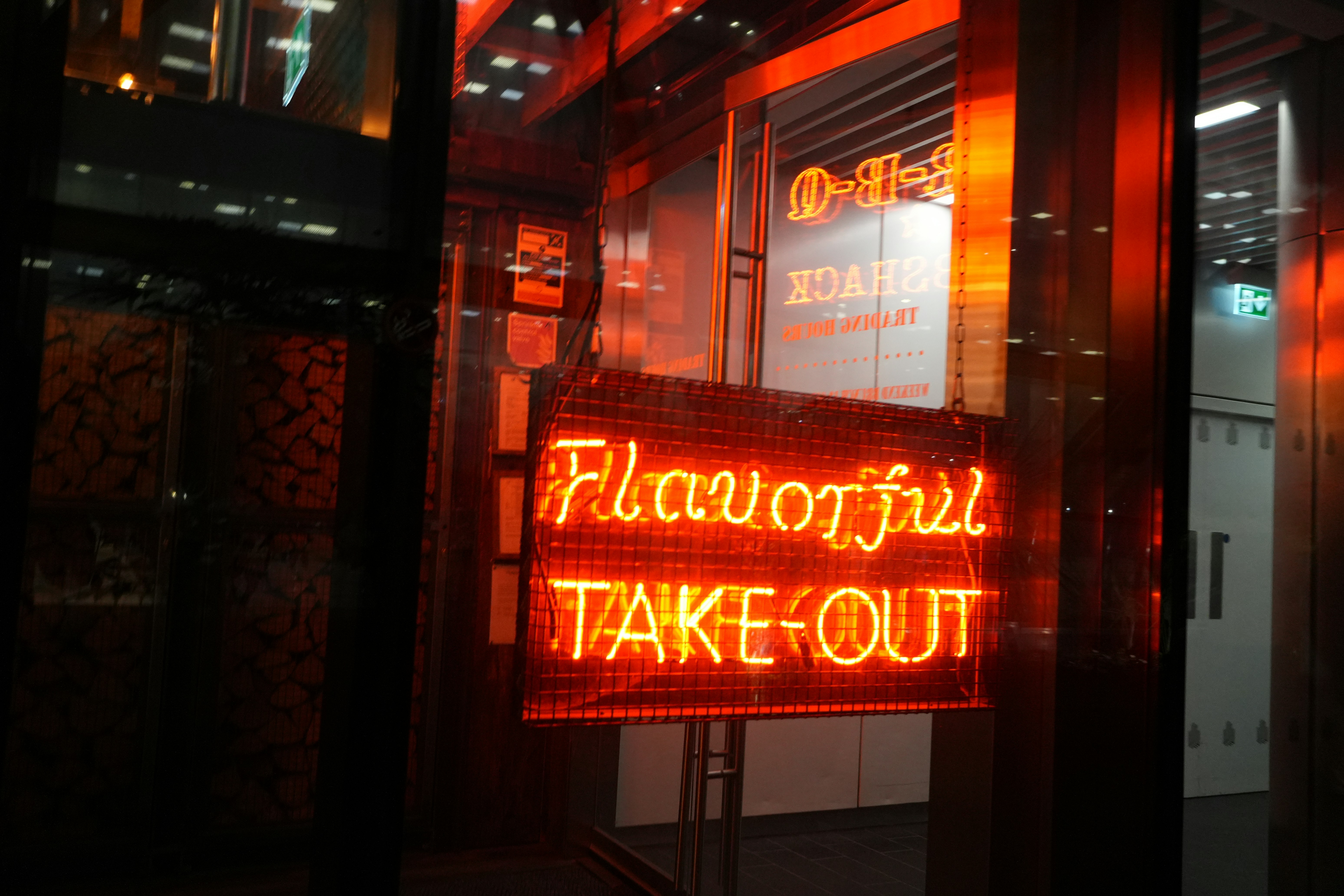 Neon Sign Reflections: A Night in Red