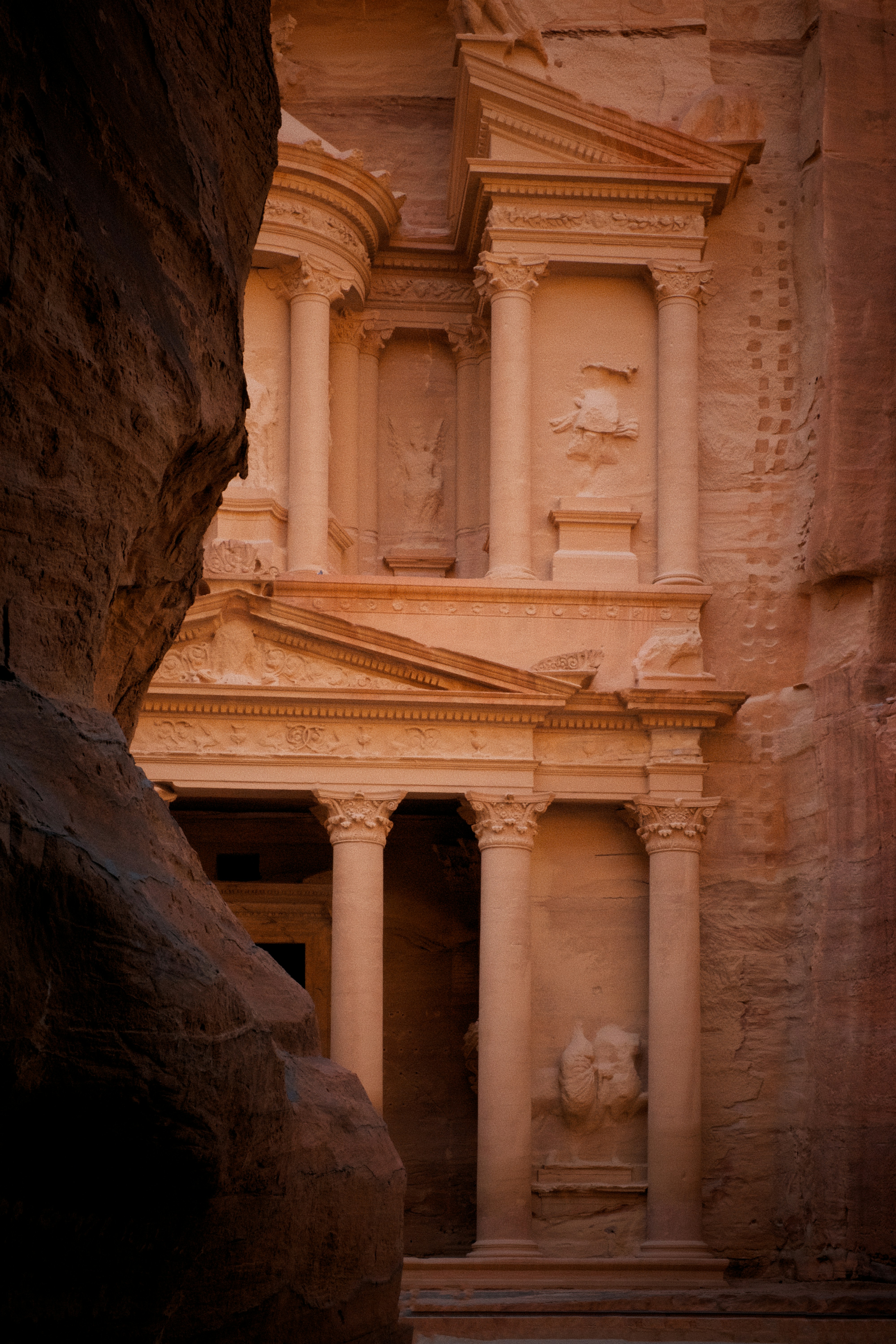 Carved Grace: The Treasury Facade Revealed Through a Narrow Gap