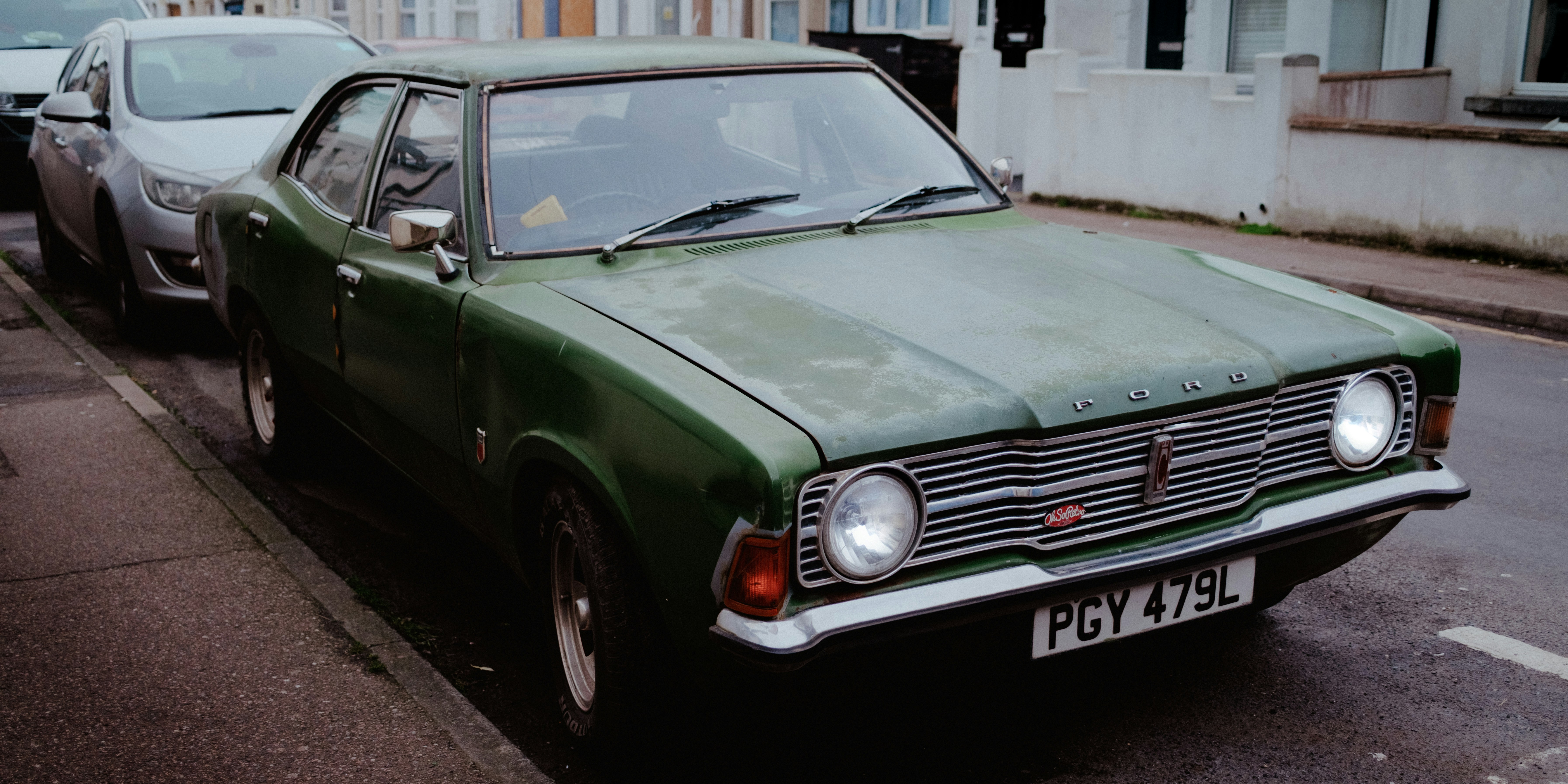 Green Classic on a Quiet Street
