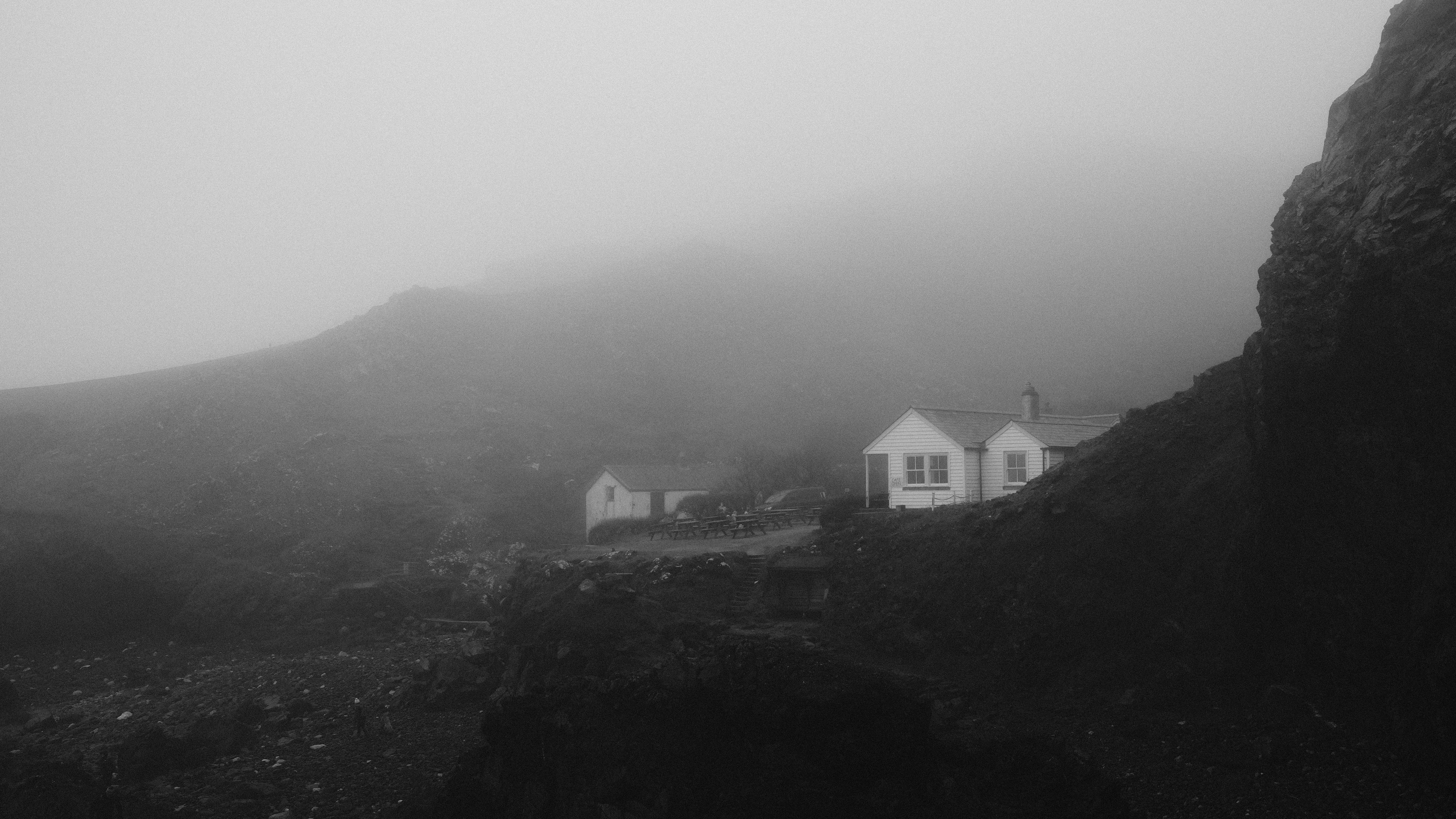 Fog-Forlorn Cottages Amid Silent Granite