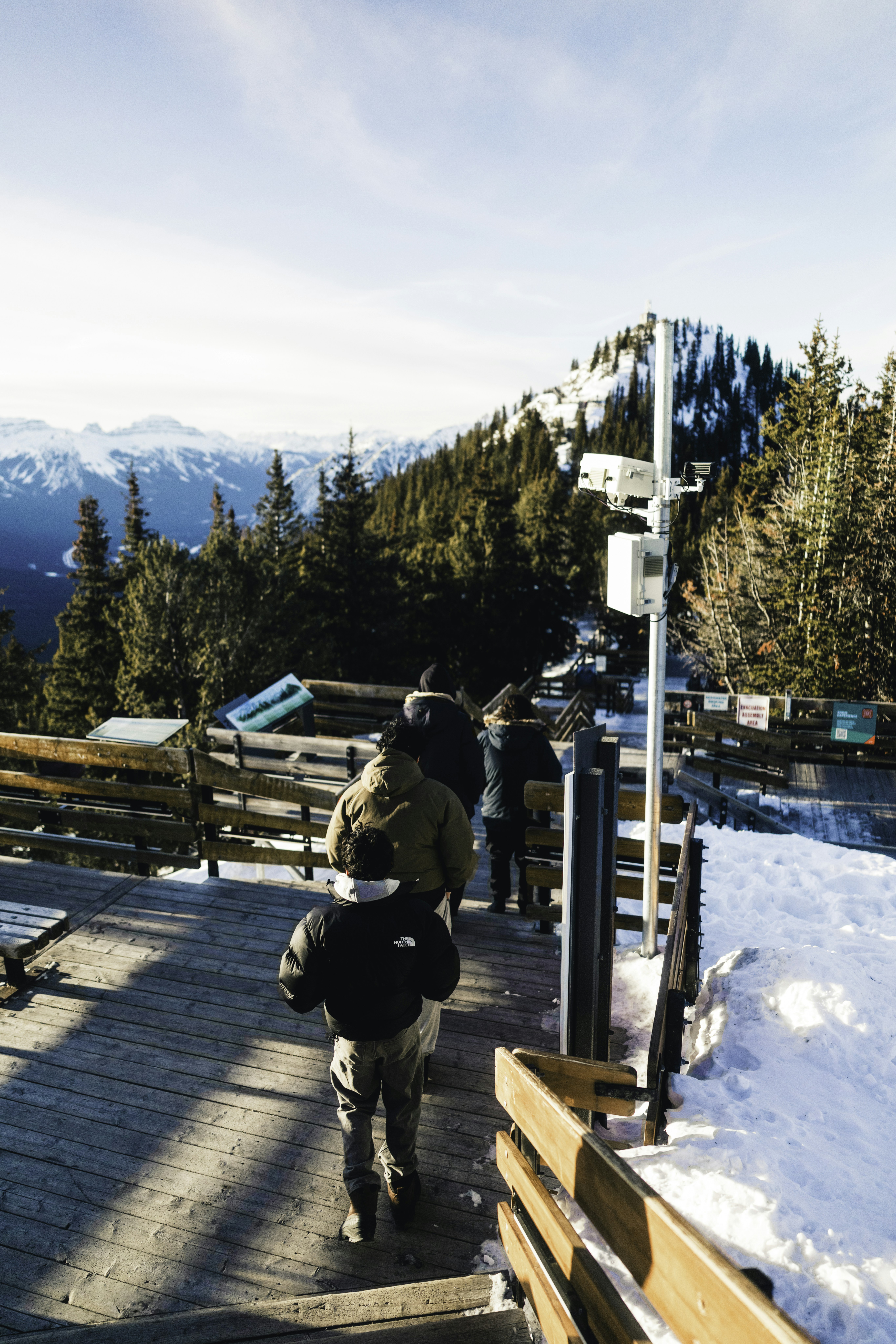 Snowy overlook at a timber-rail viewing platform