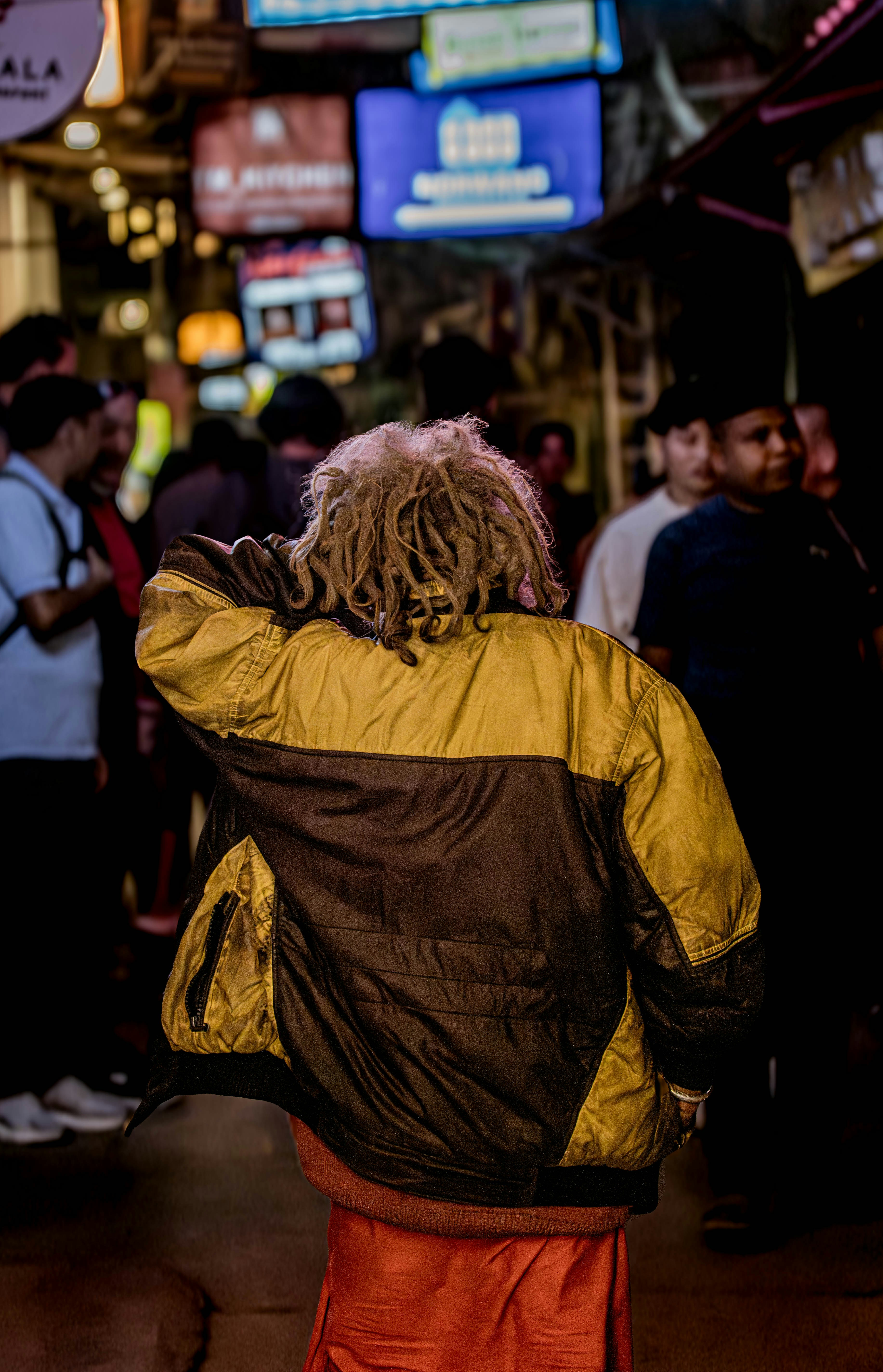 Back to the Crowd: Neon Street Portrait in a Busy Night Market