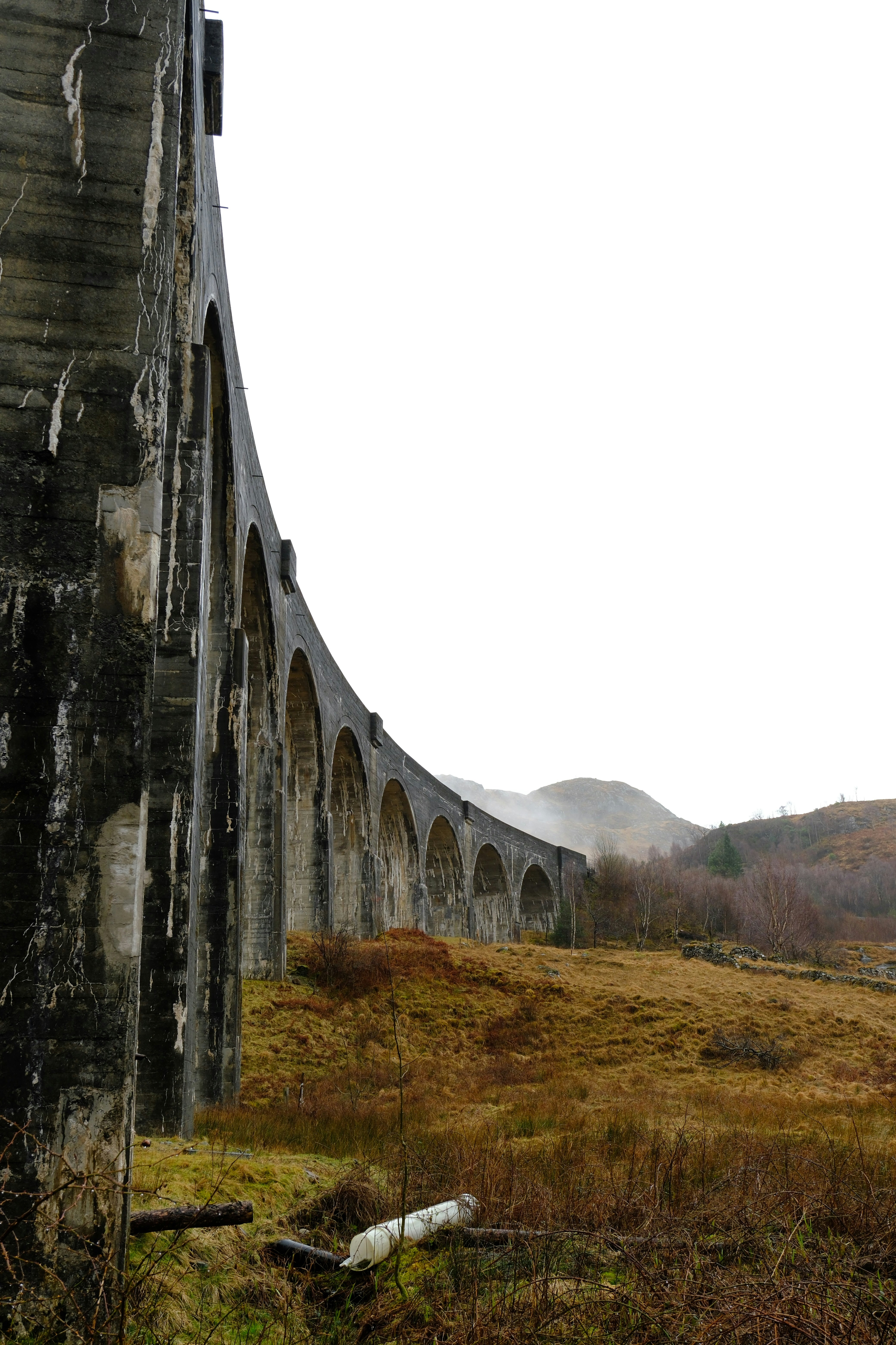 Lonely Archways: A Viaduct's Weathered Dialogue Across the Moor