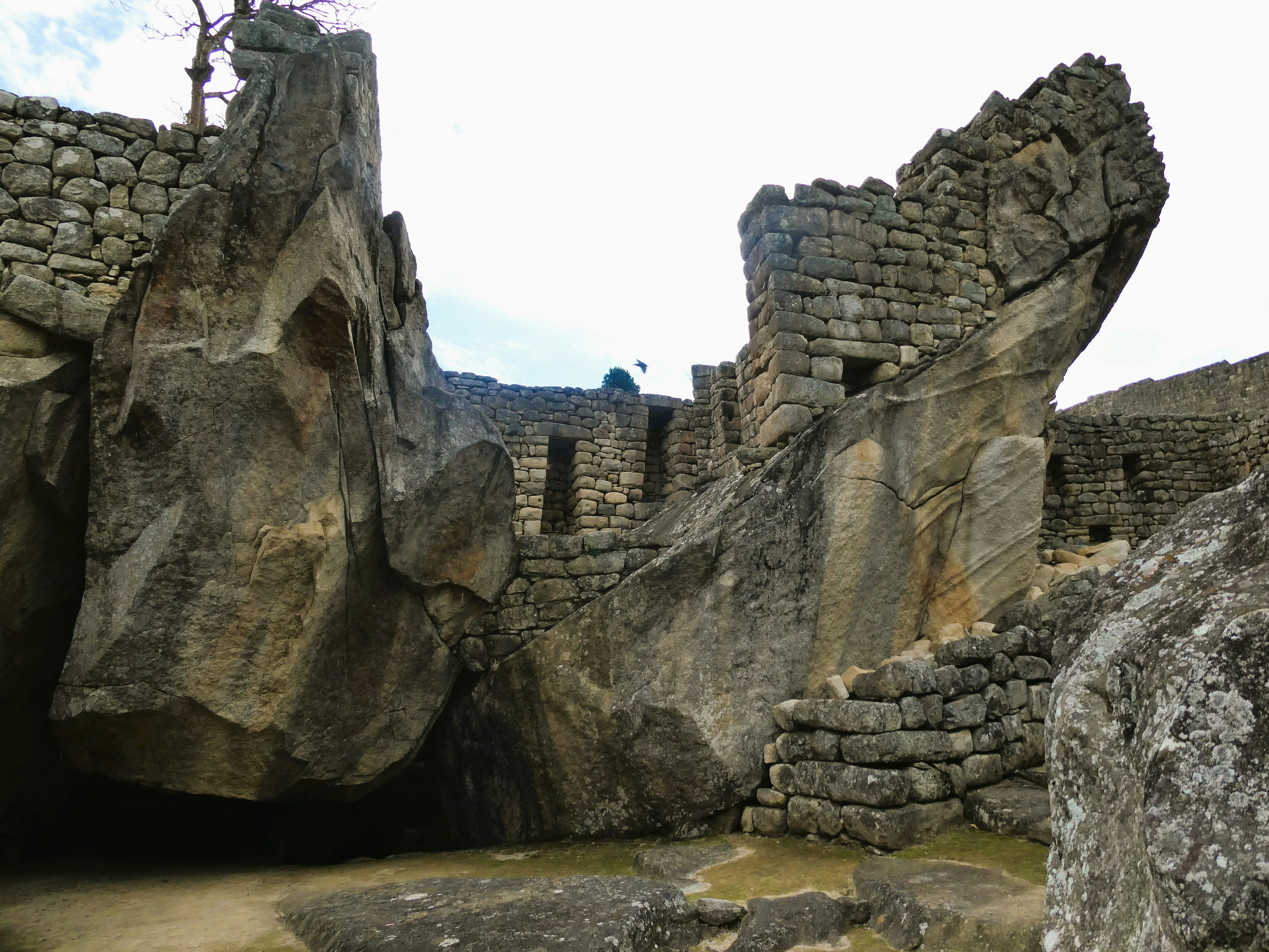 Temple of the Condor in the 'Lost City of the Incas', Inca citadel of Manchu Picchu. Built around 1450 in the Andes mountains above the Urubamba river valley between two sharp peaks. The terraces of Machu Picchu were used for the slope stabilization and corn cultivation.
