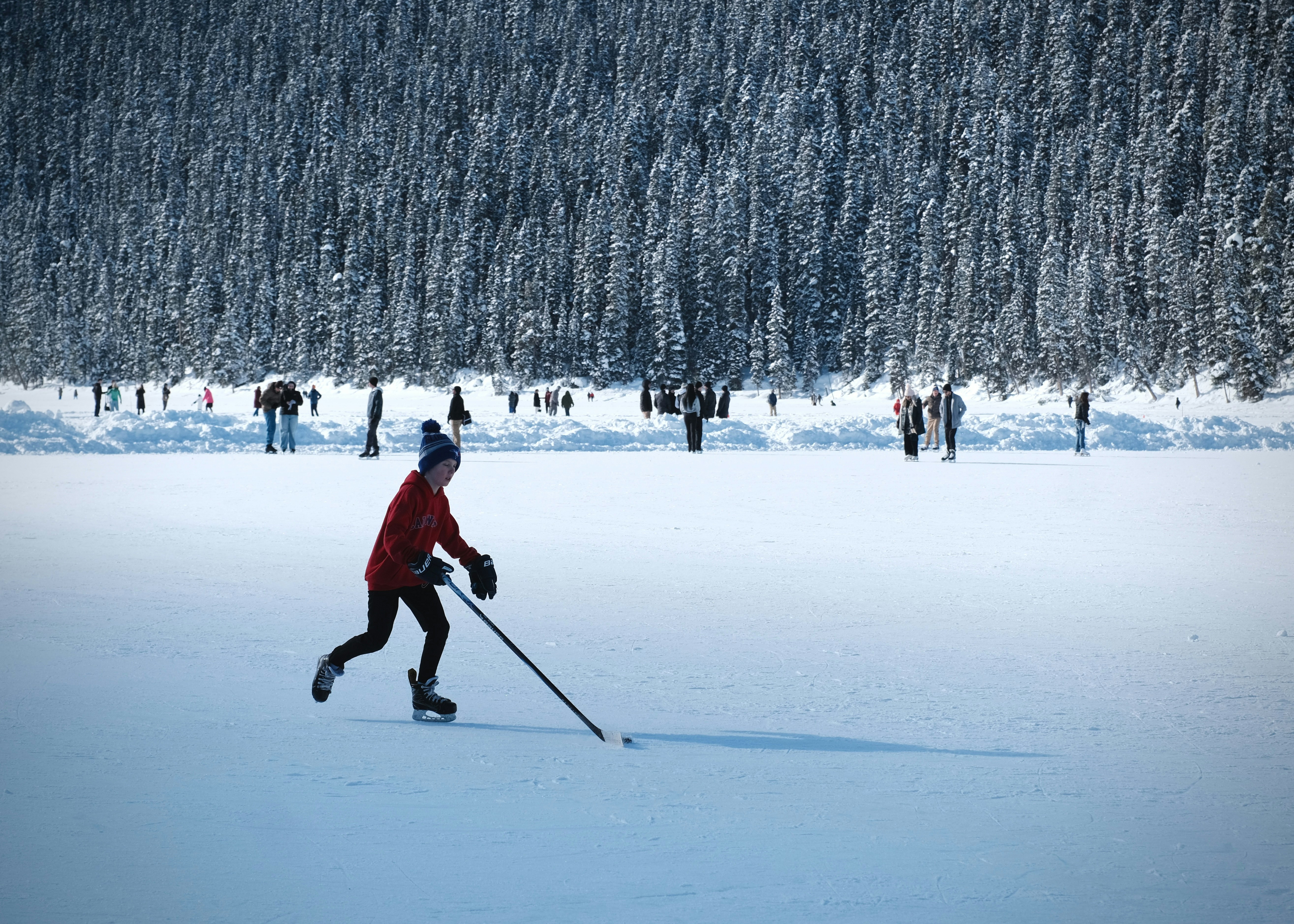 Silhouette of a Skier Tracing a White Field