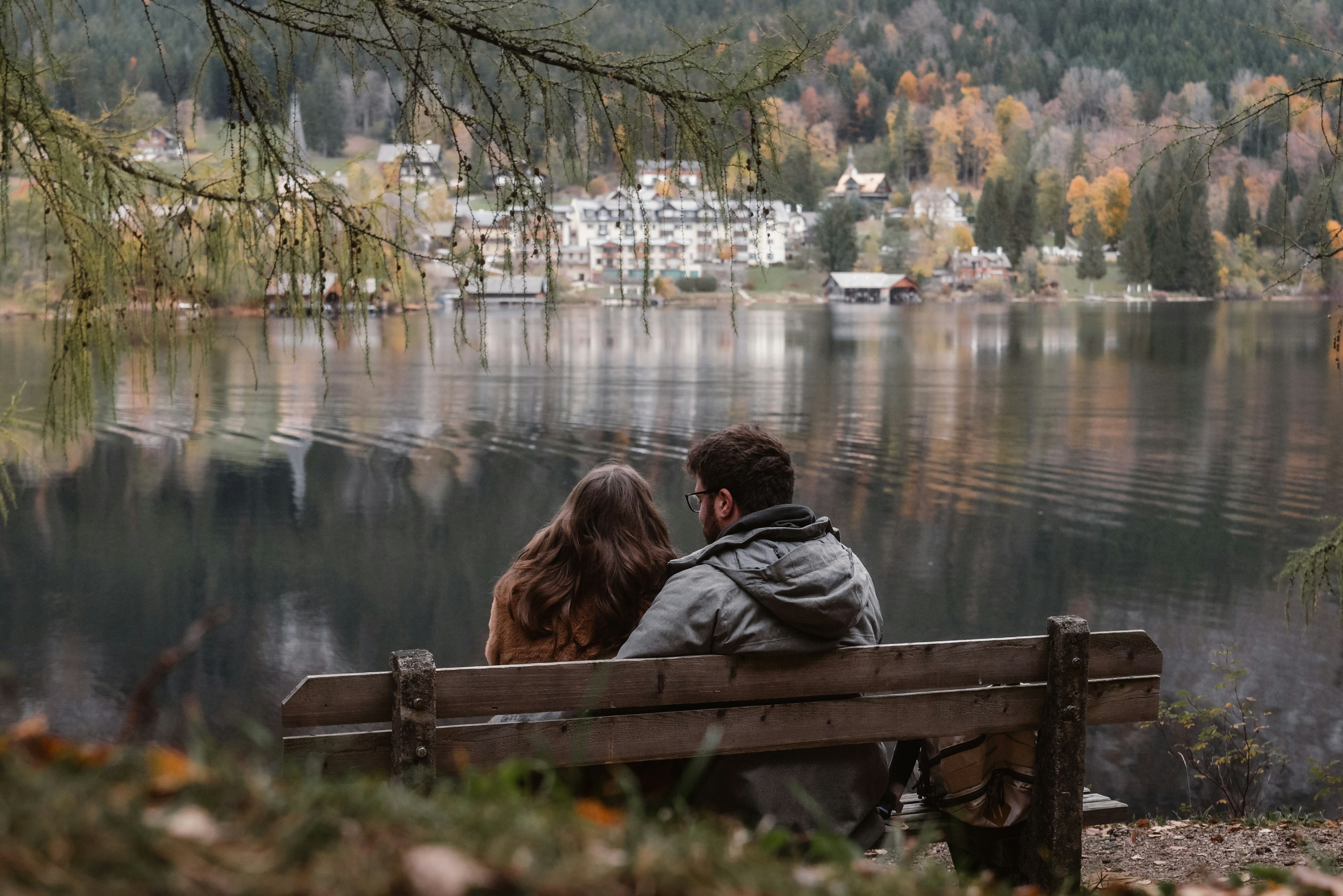 Together by the Lake: Quiet Moment on an Autumn Bench