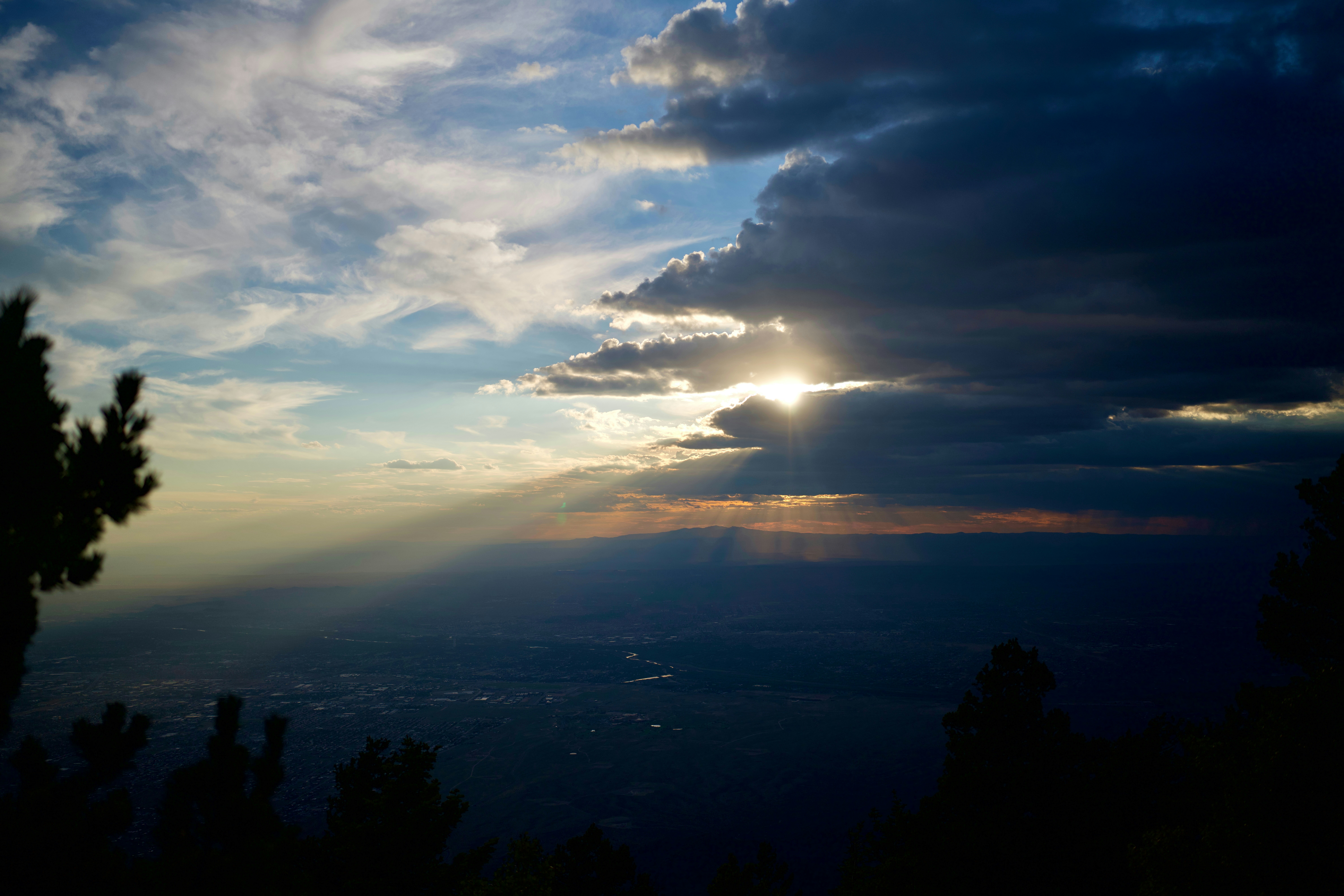 Sunlit Break Over a Distant Horizon