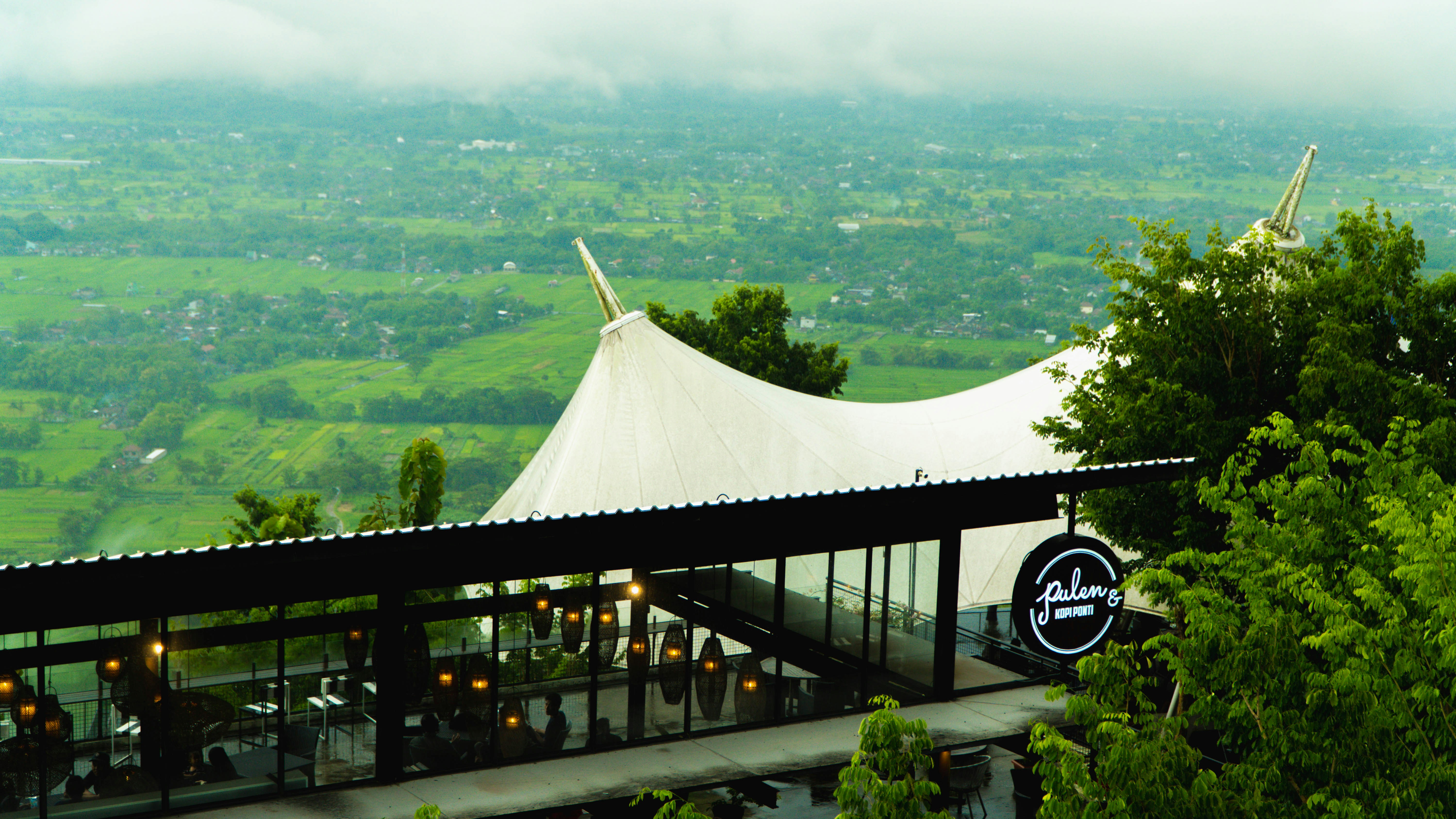 Observatory Café Terrace Fringed by Verdant Hills