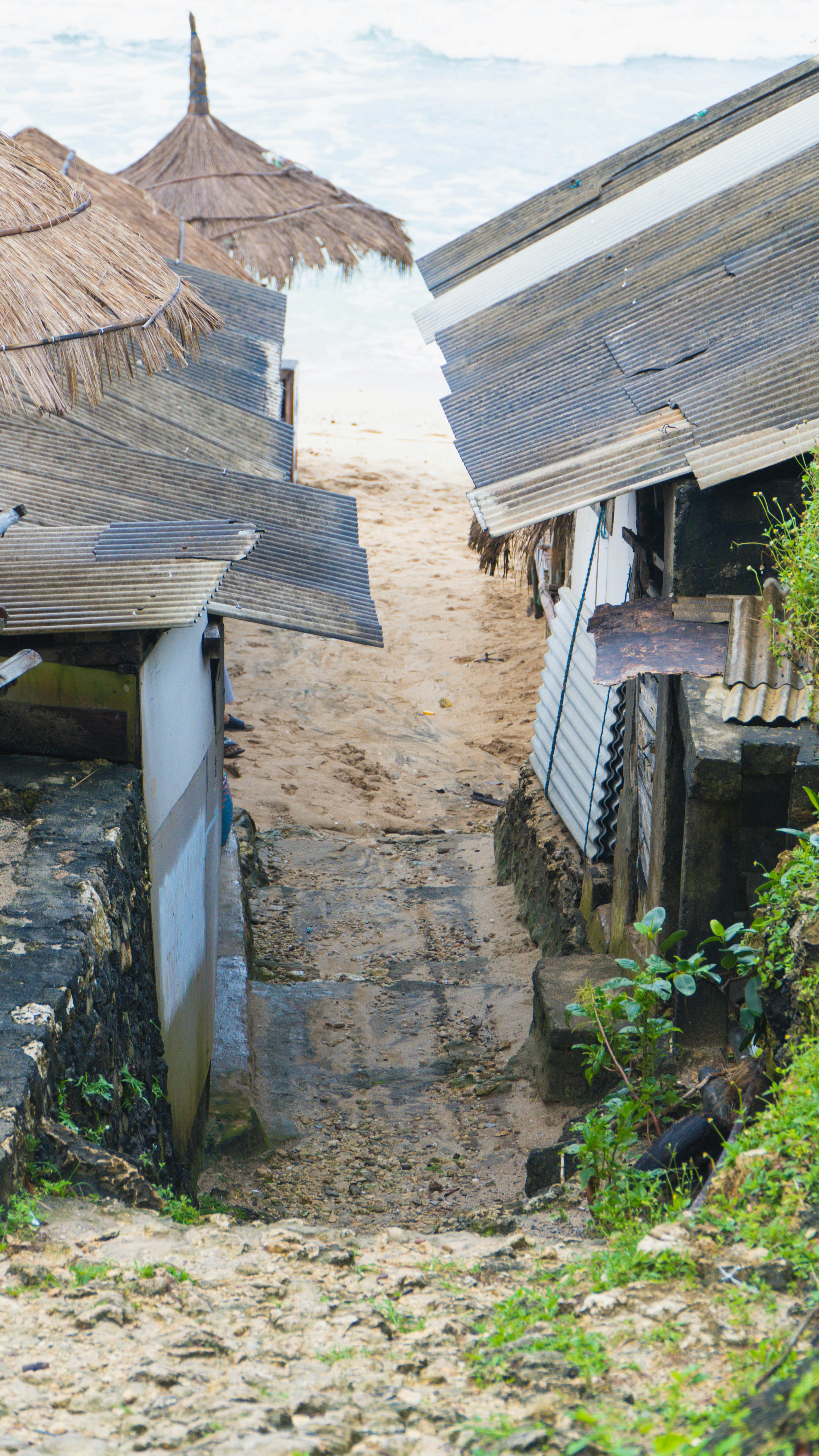 Coastal Path Between Weathered Shacks