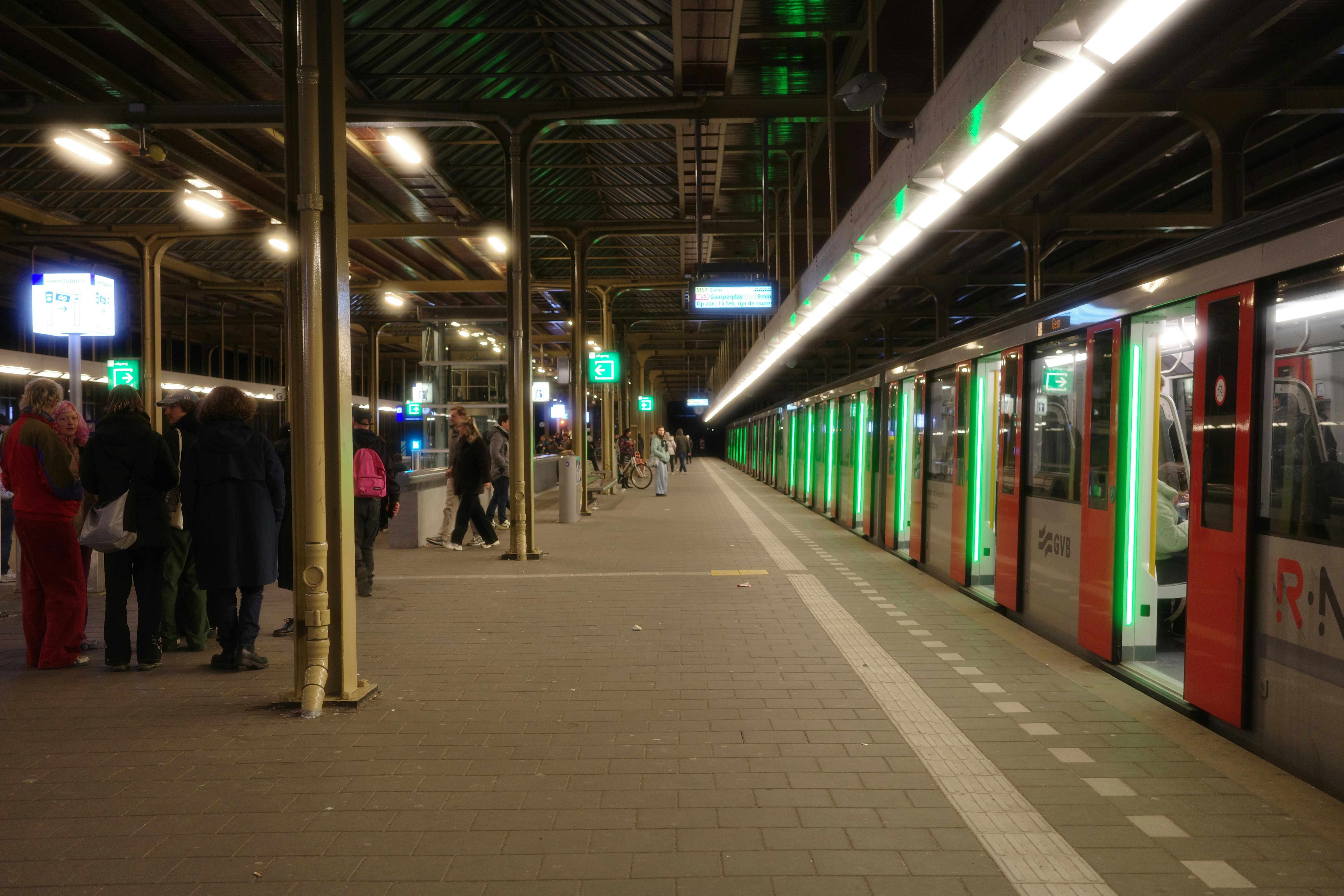 Platform Pulse: Commuters Await the Next Train
