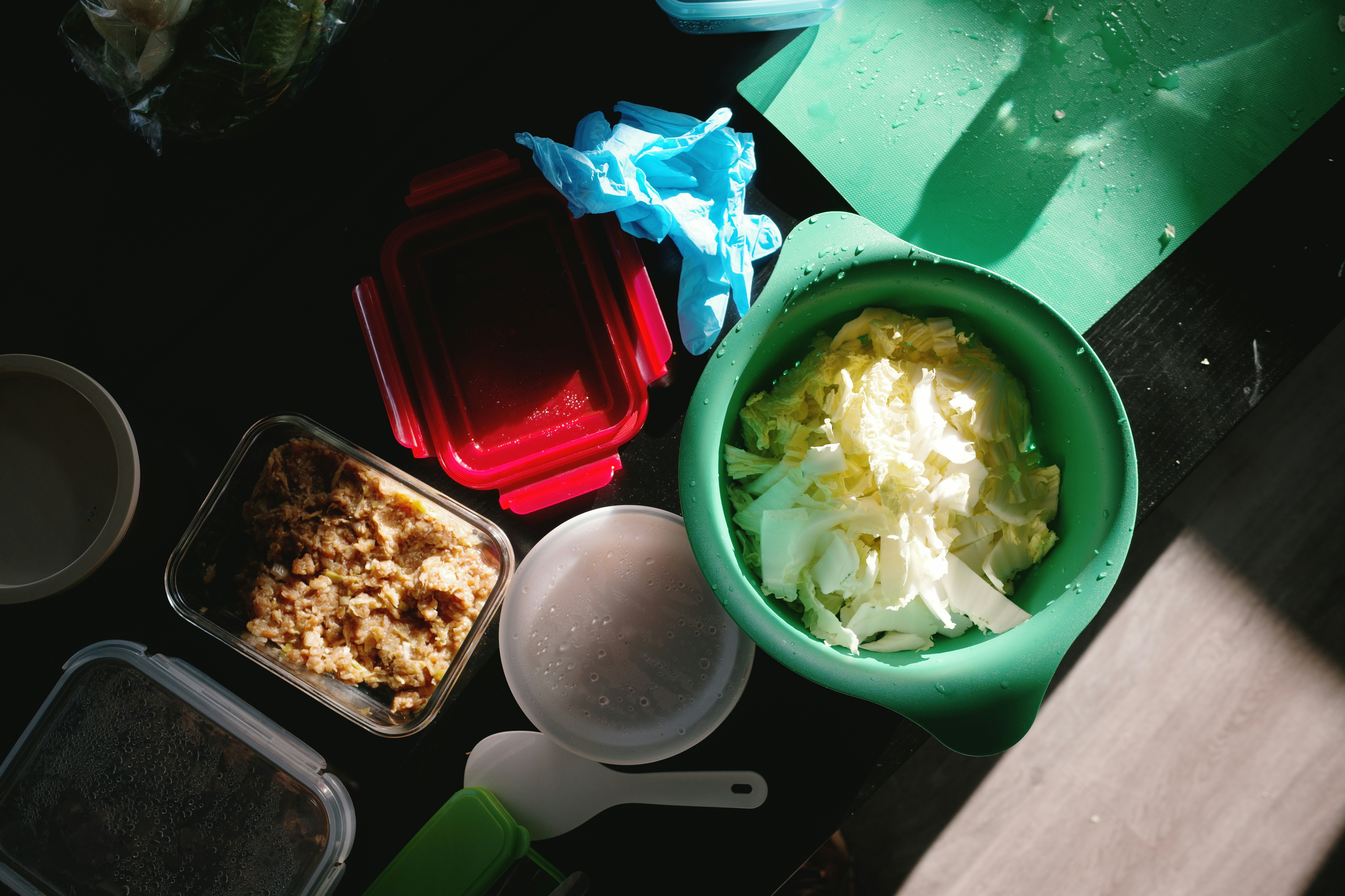 Overhead view of chopped vegetables and ingredients for cooking.
