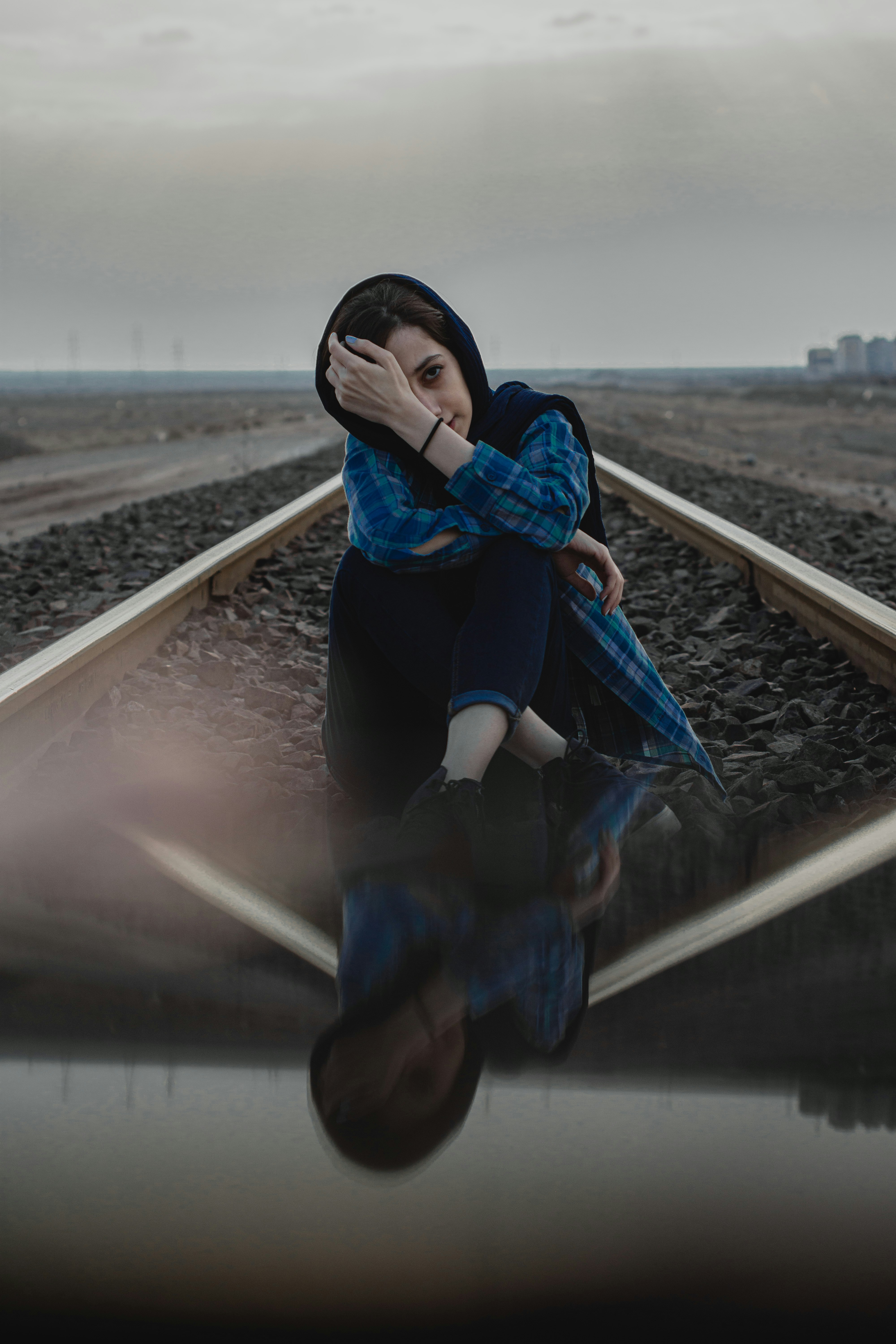 Solitude on the Rails: A Quiet Portrait by the Tracks