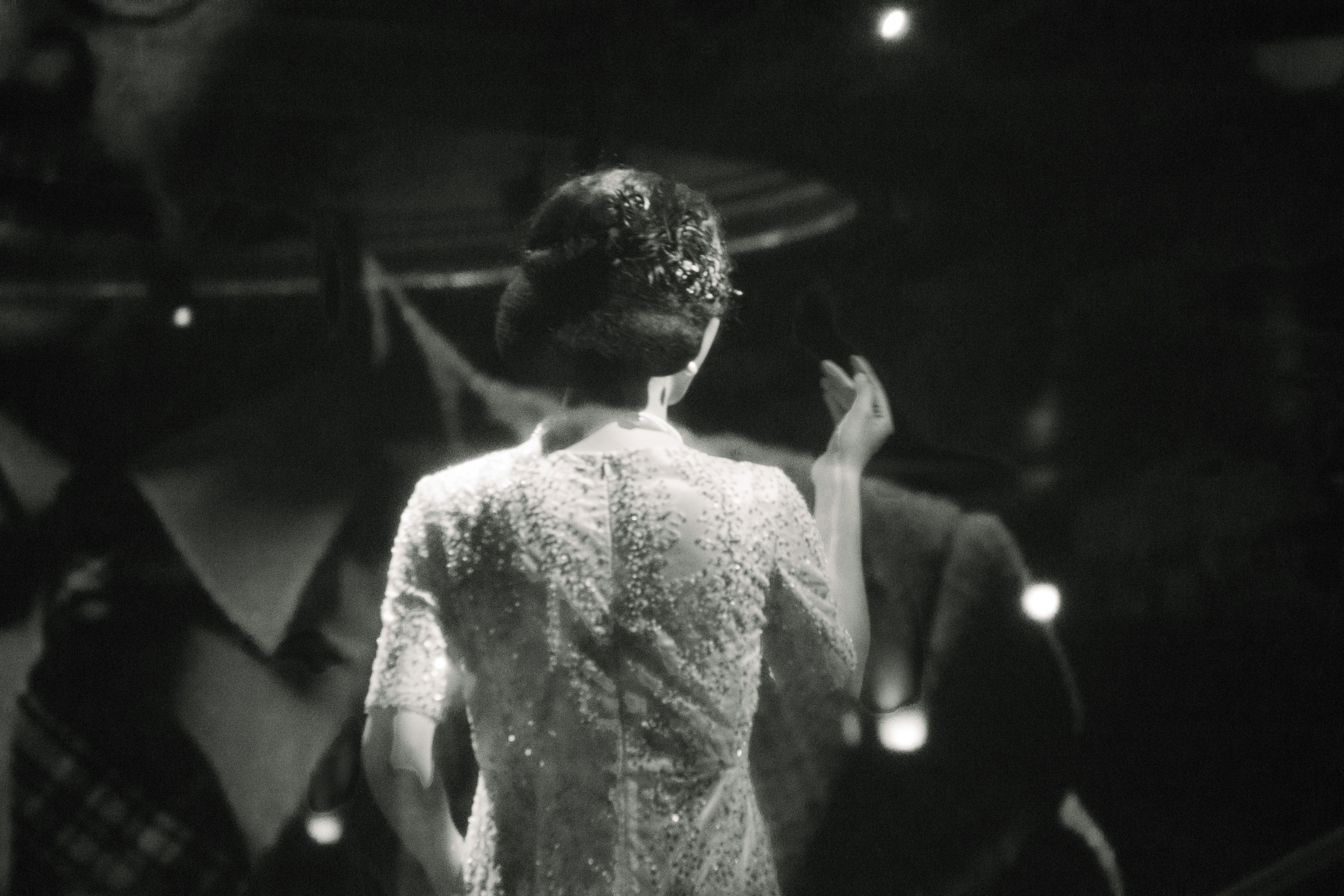 Backstage in Satin Light: A Glimpse of Quiet Movement