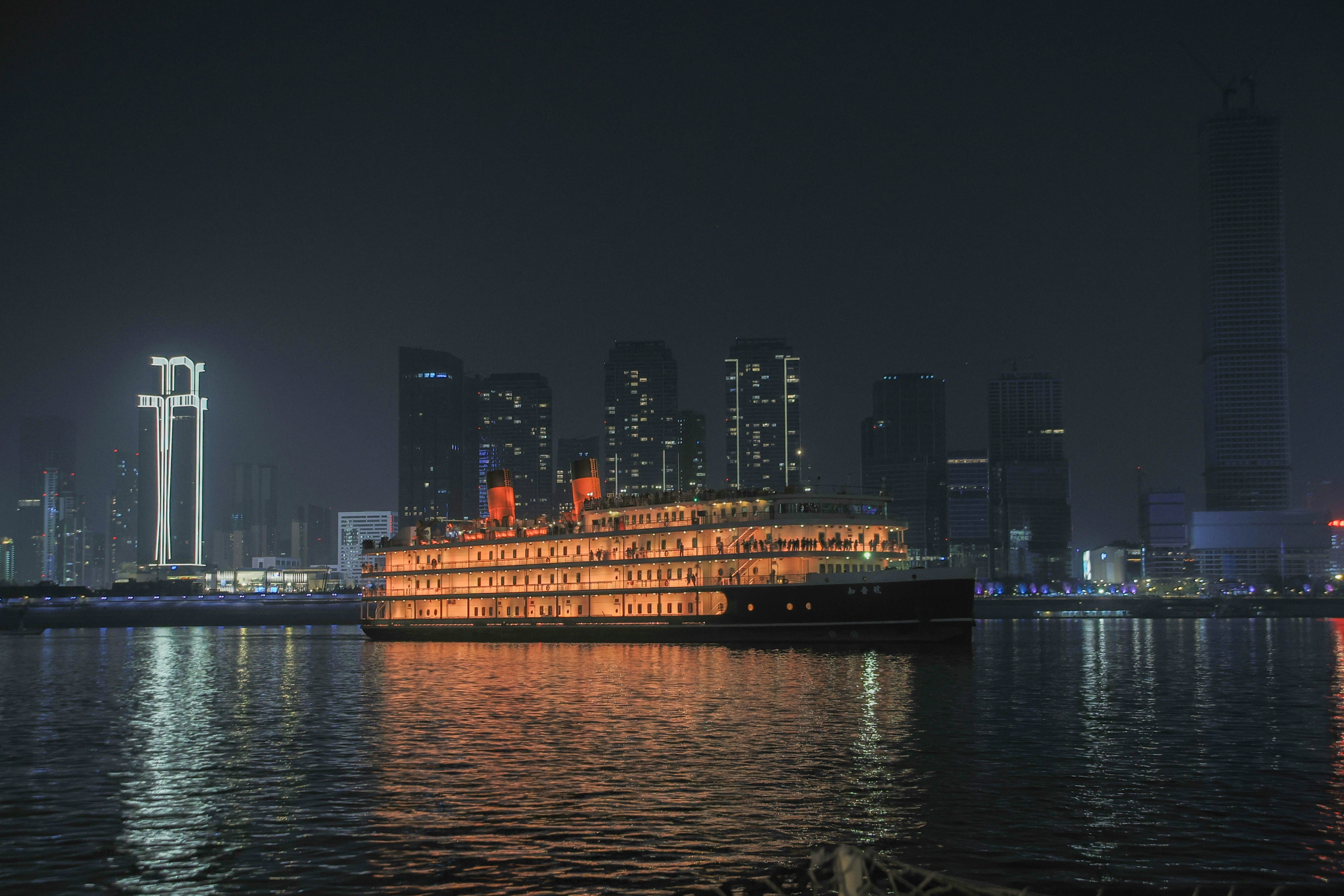 Midnight Boat on a Quiet Skyline River