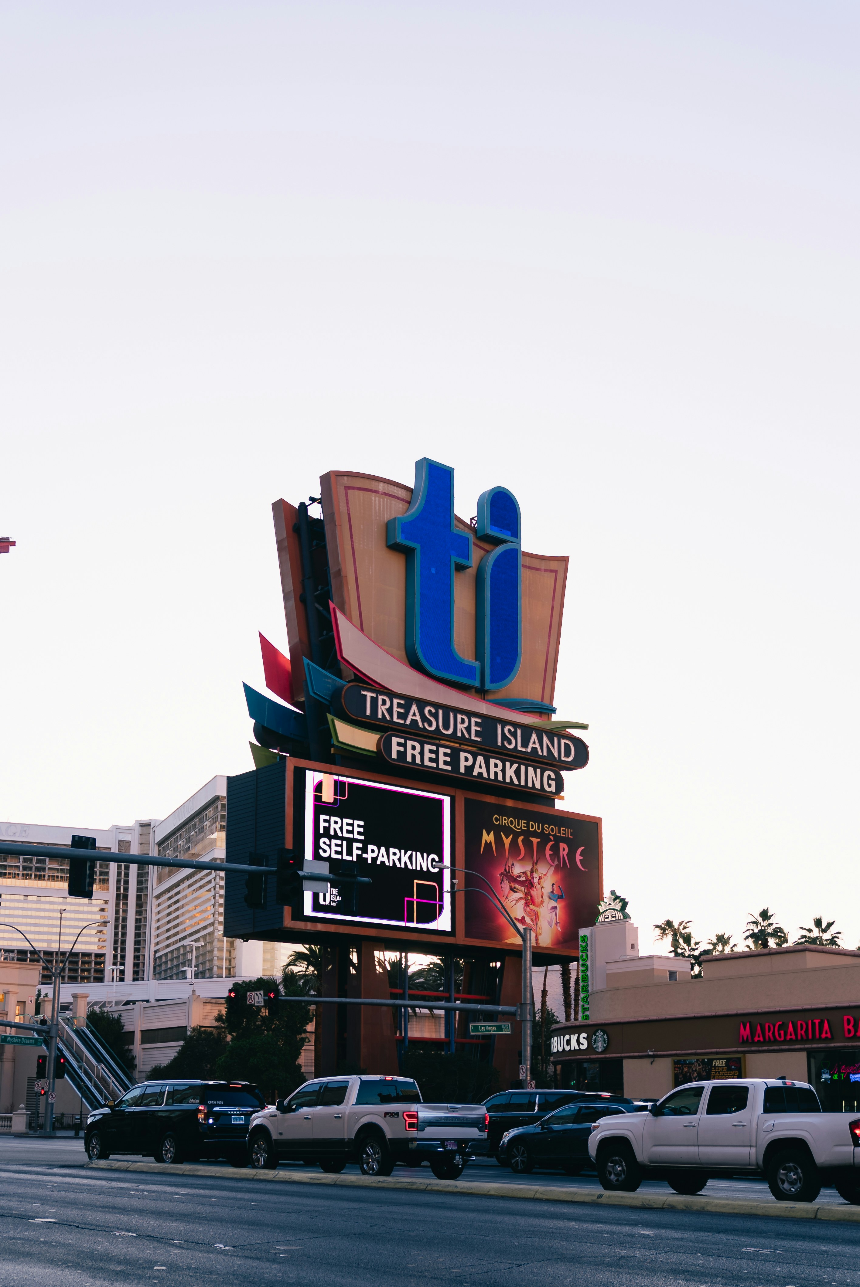 Neon Signage at Treasure Island: A Sunset Stopover