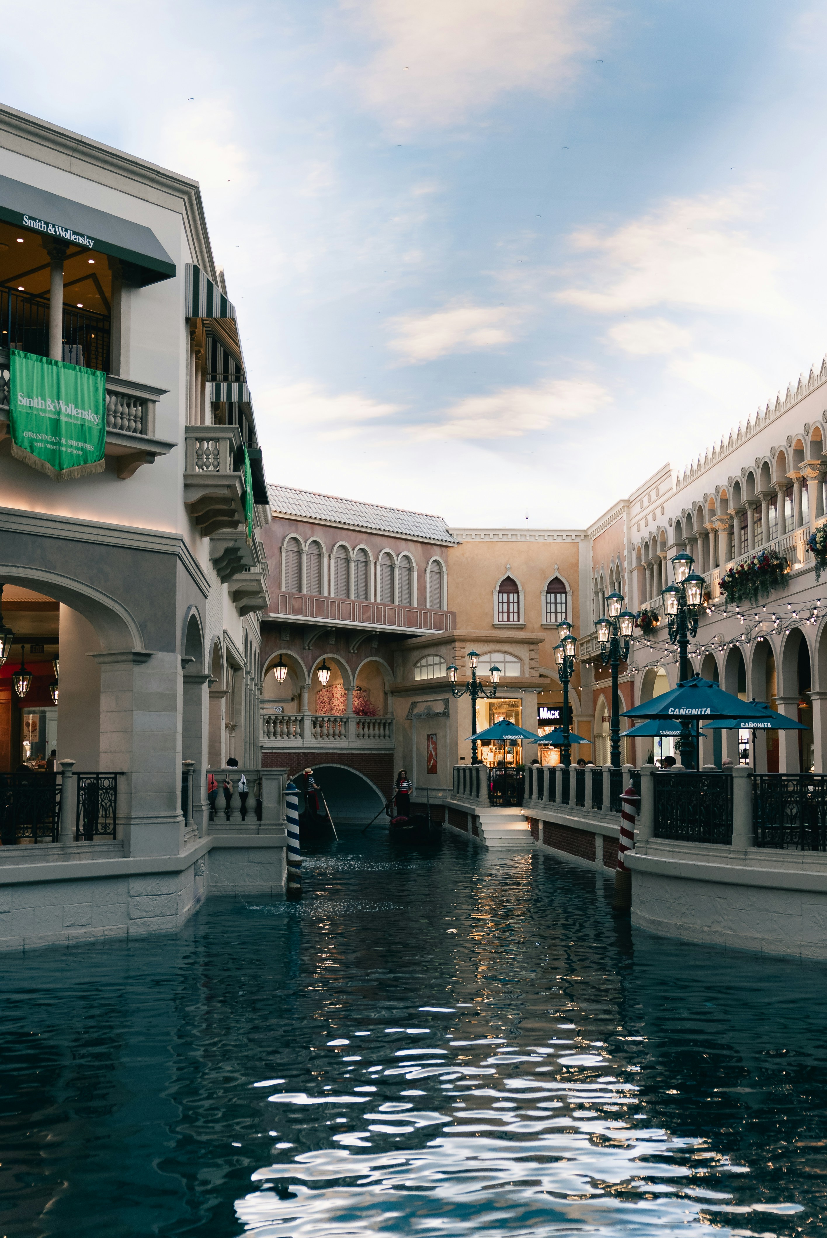 Venetian-style canal with buildings and sky.
