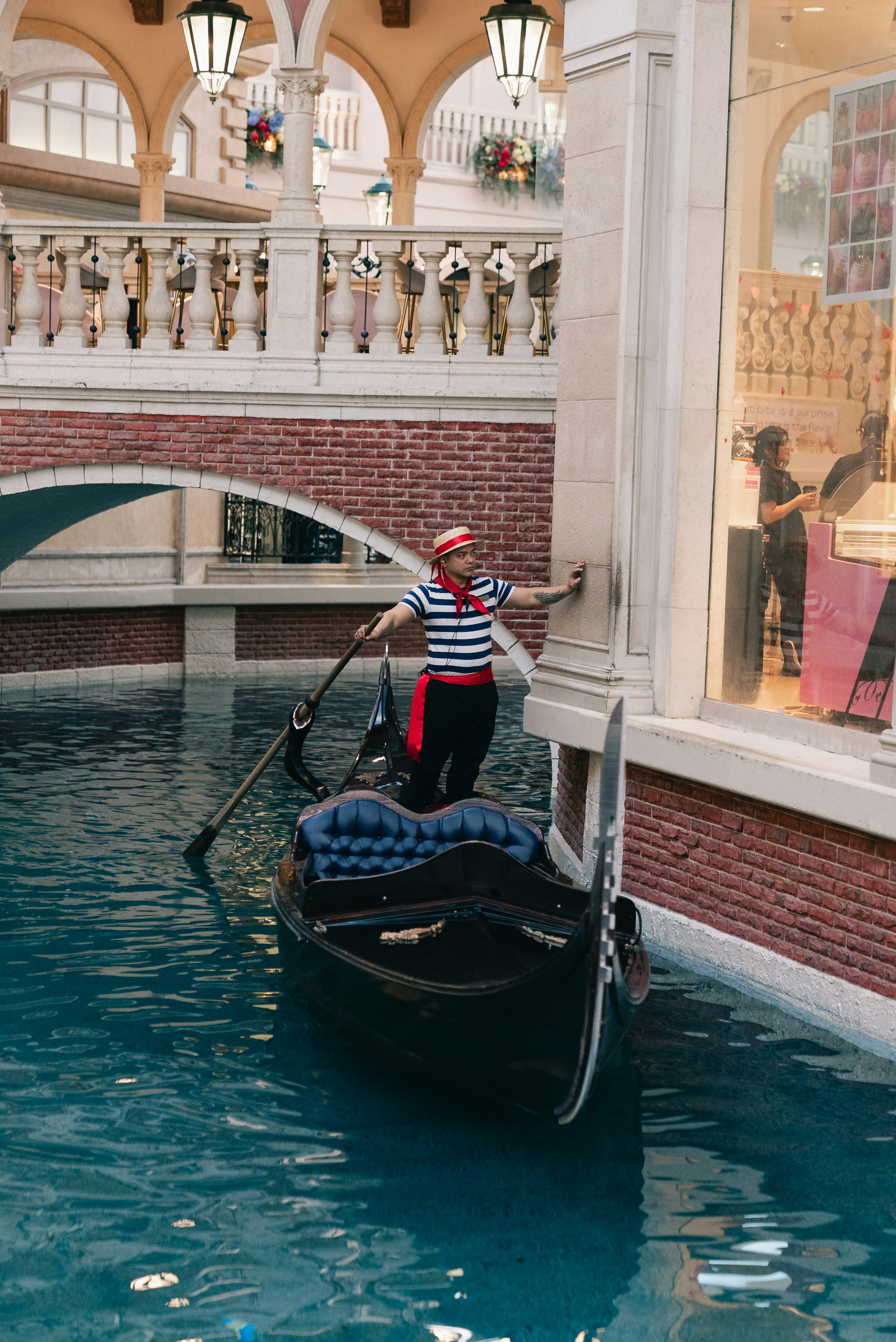 Gondolier at the Venetian Canal Corner