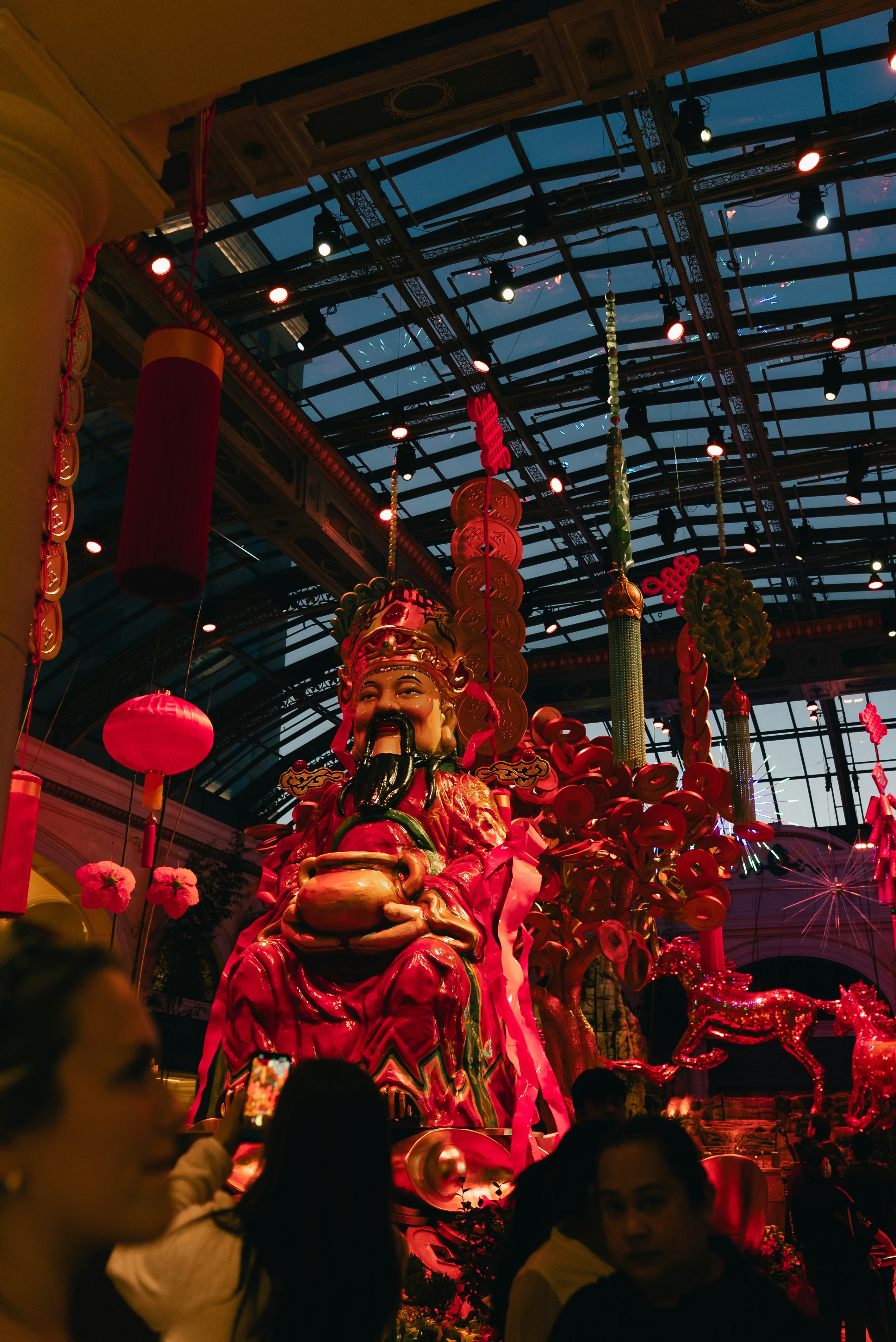 Gilded Deity Amid Lanterns: Lunar New Year Exhibit