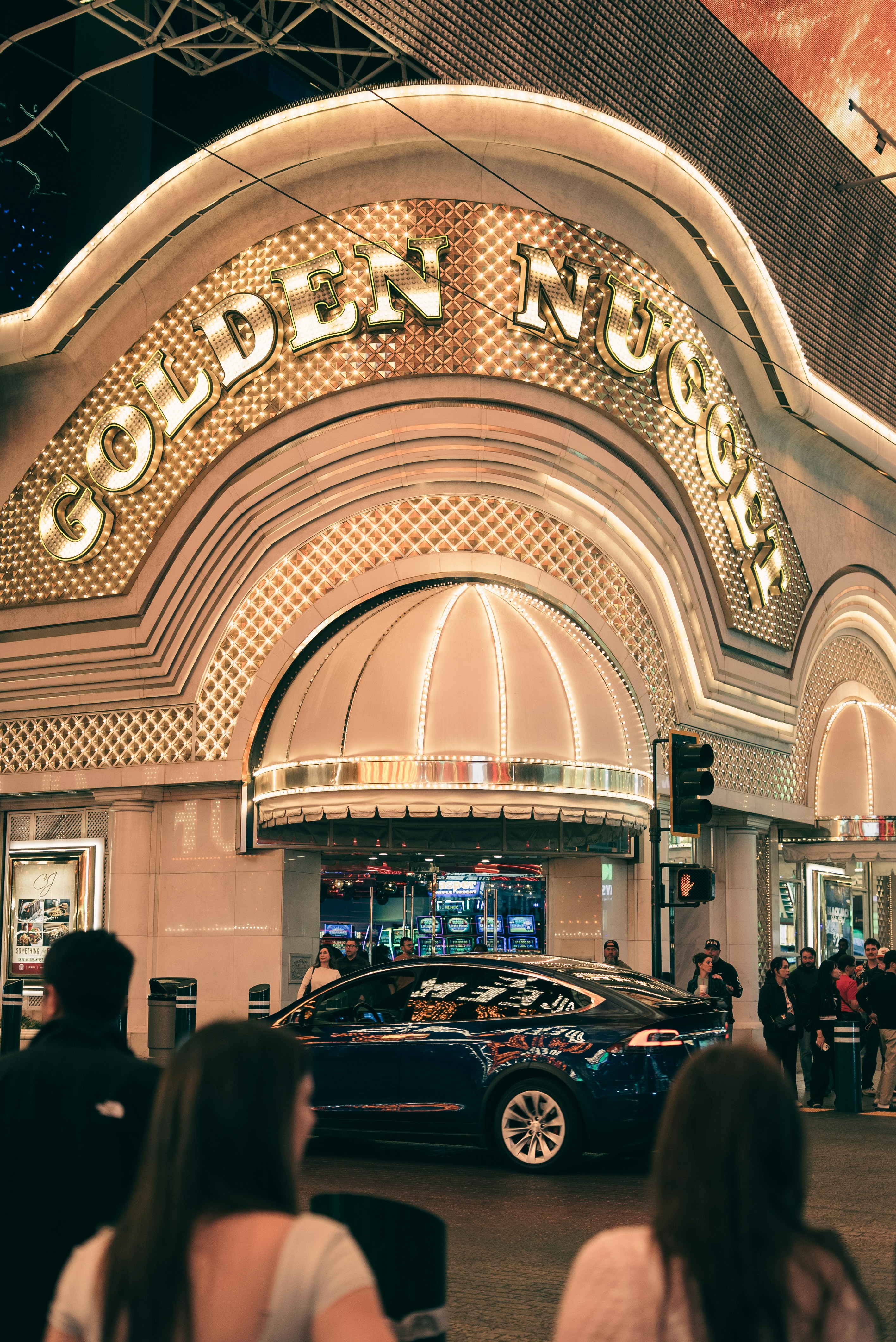 Golden Neon Portal: A Las Vegas Welcome Under the Arcade