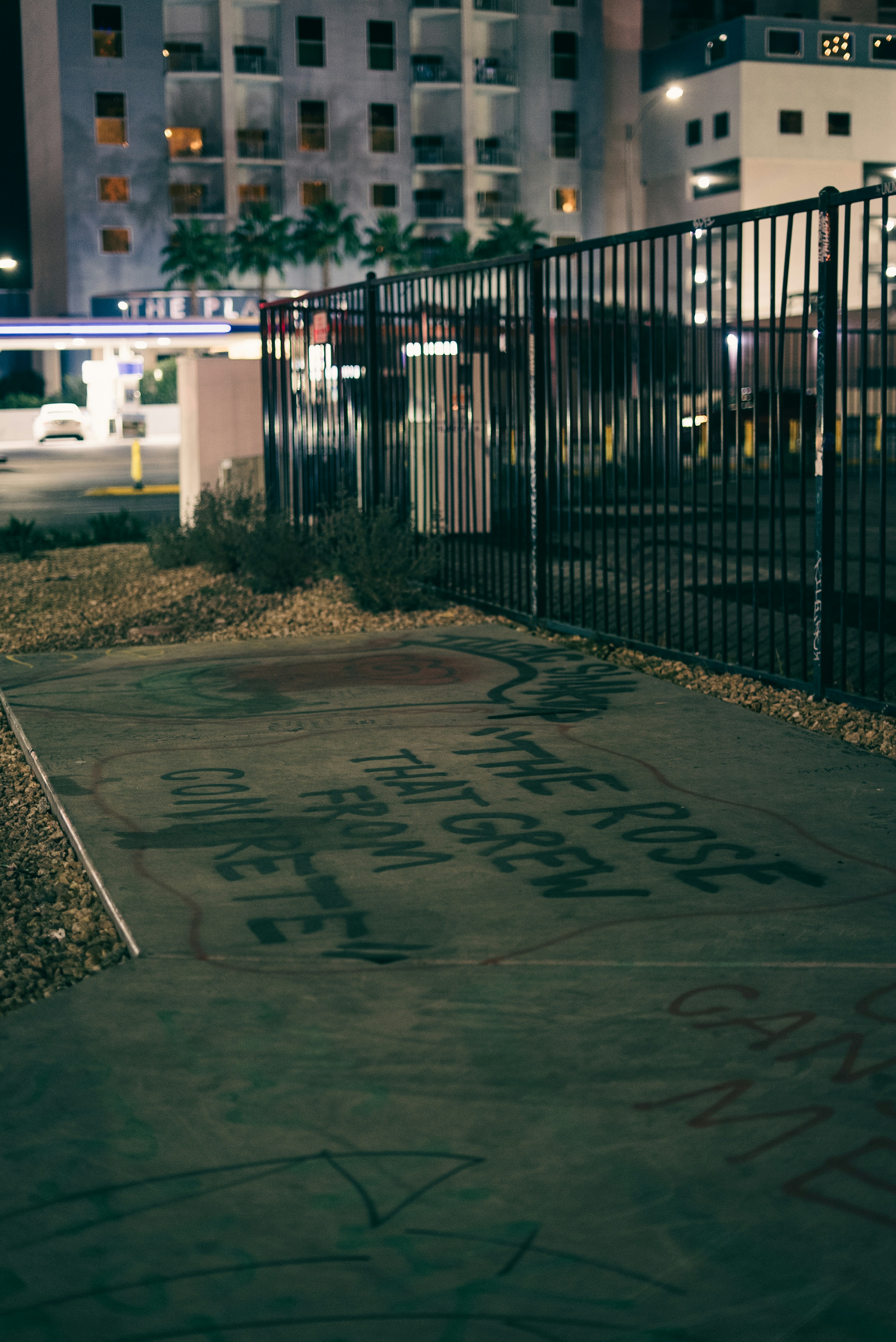 Graffiti Pathway under Neon Night in the City Courtyard