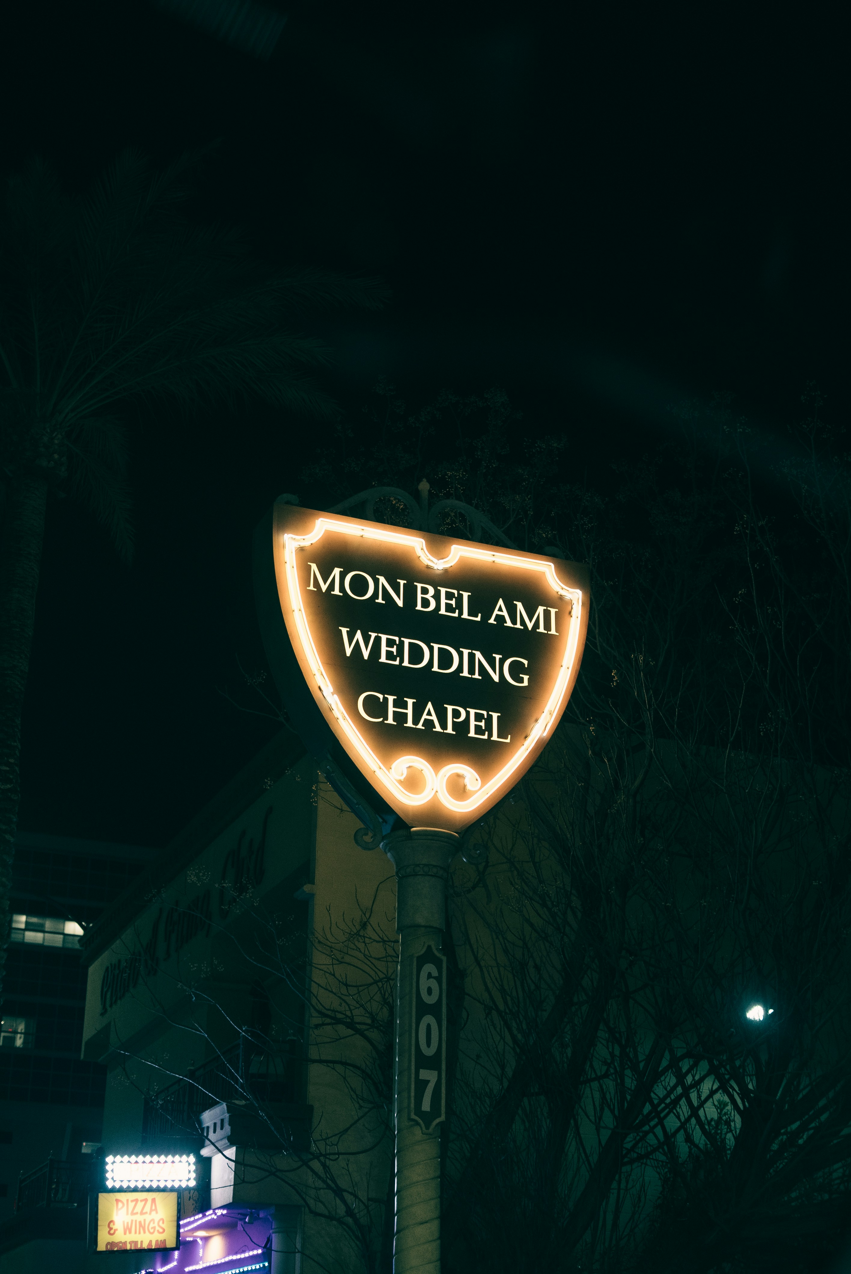 Neon Sign: Mon Bel Ami Wedding Chapel Illuminates the Night
