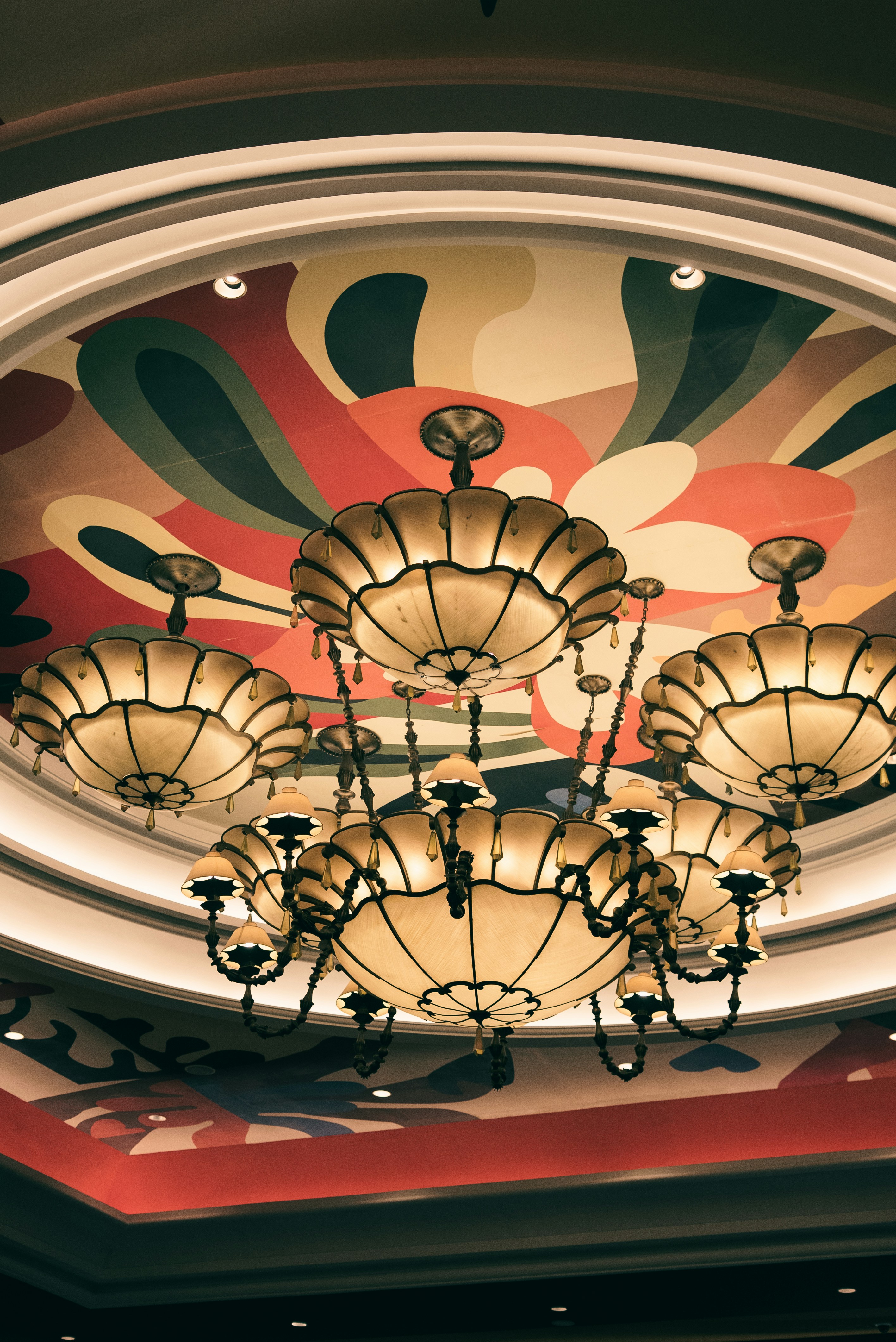 Chandelier Carousel: A Retro Ceiling Fresco in Golden Hues