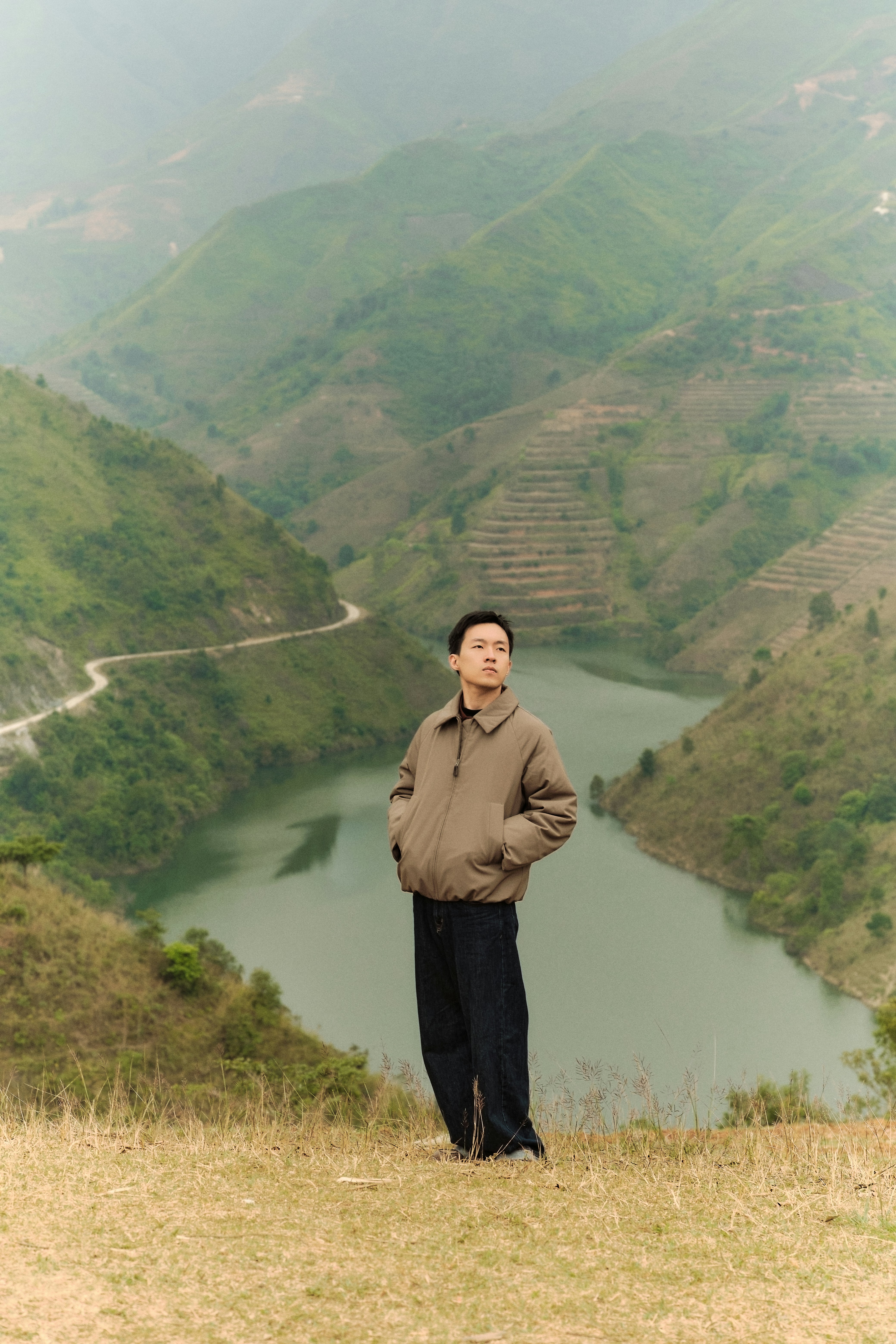 Horizon Gaze: Man in a Gentle Valley