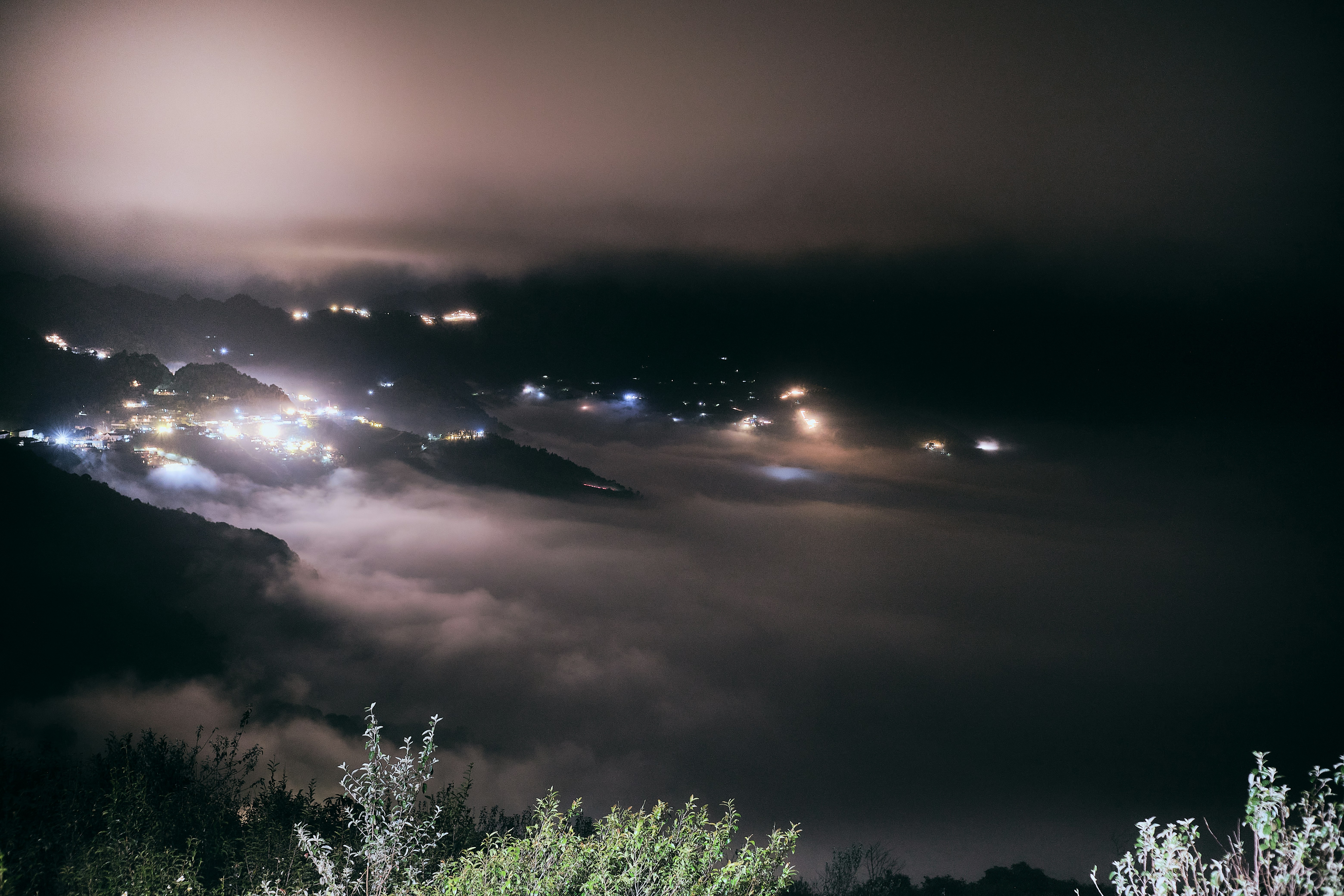 Night Fog Over a Distant Coastal Town