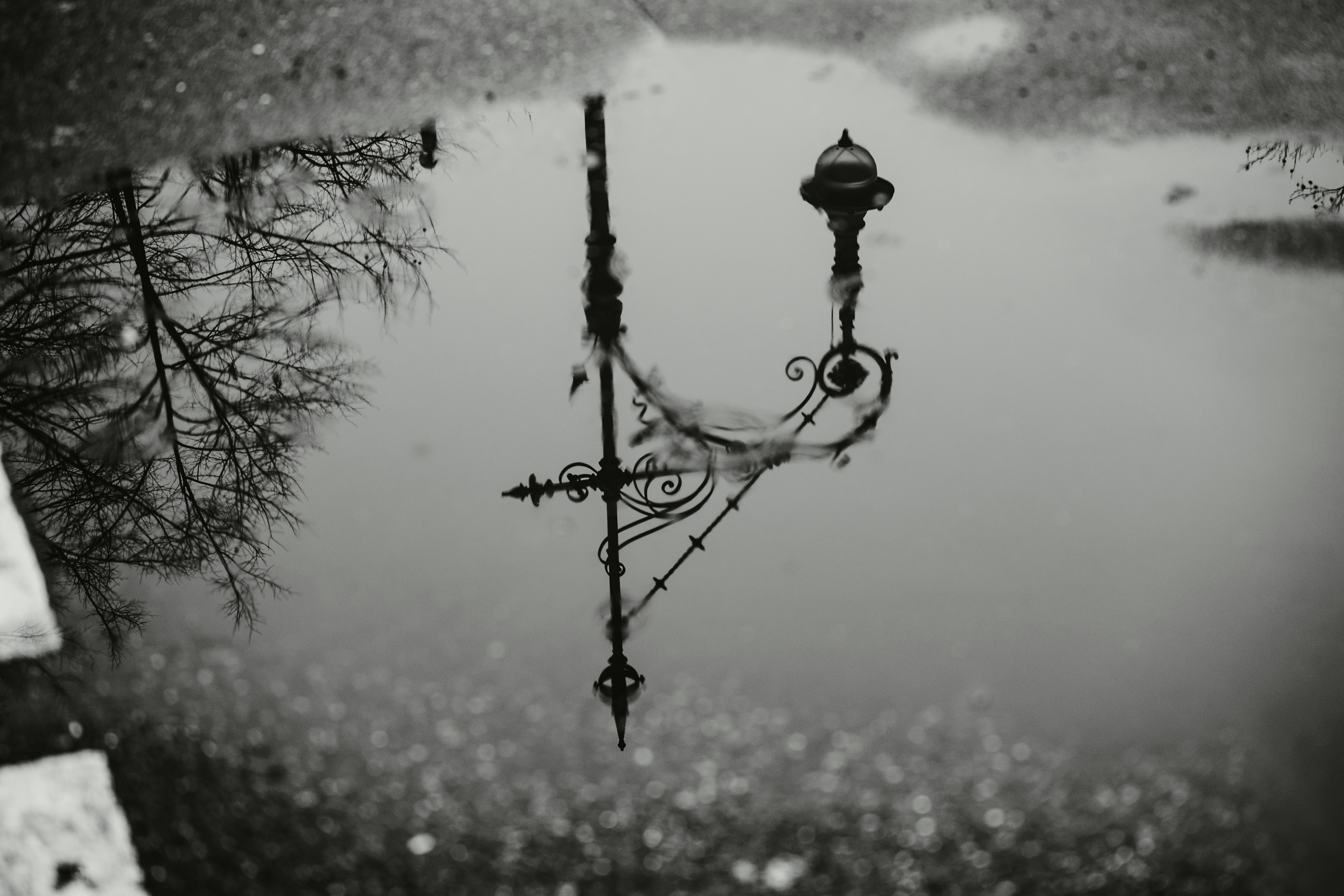 Echoed Lanterns: A Quiet Reflection in Stone and Water
