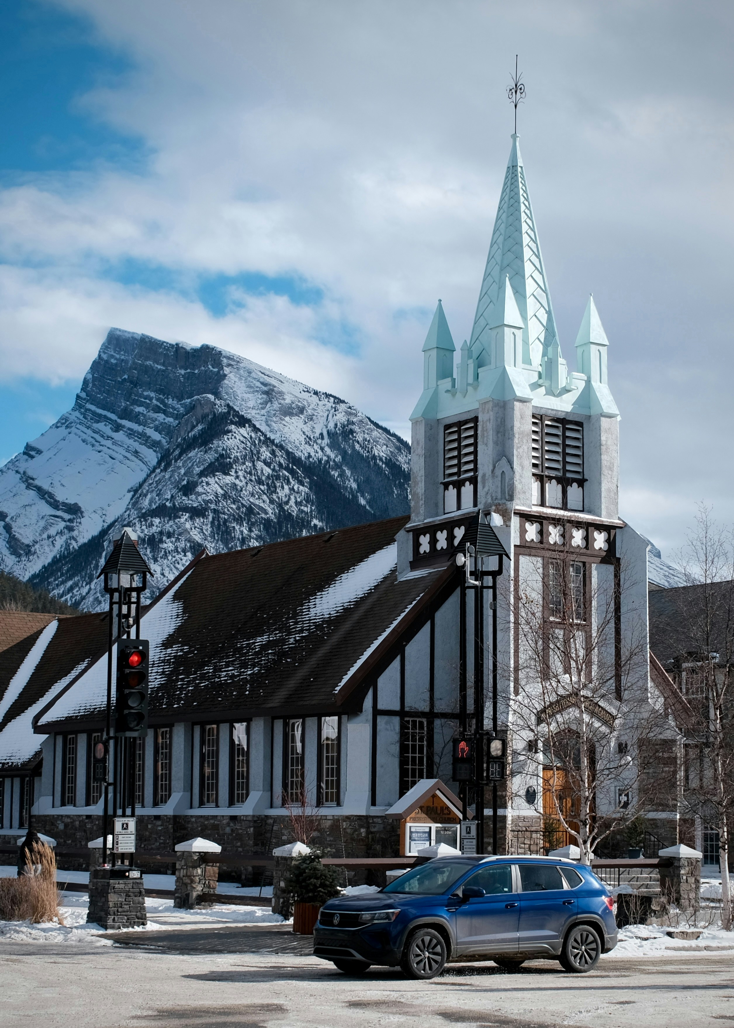 Snowy Chapel Front and Mountain Backdrop