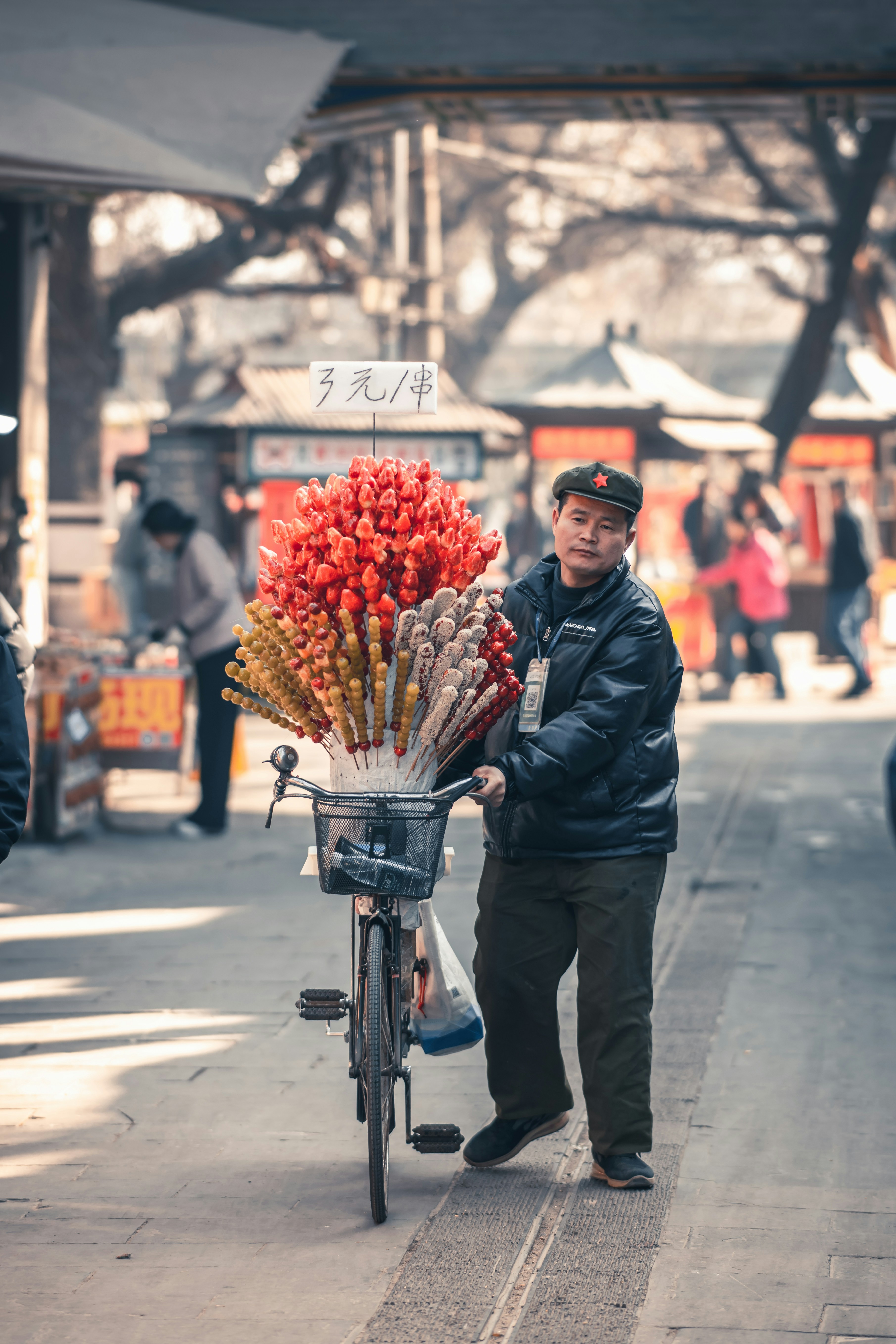 Street Vendor with a Towering Bouquet on a Busy Day