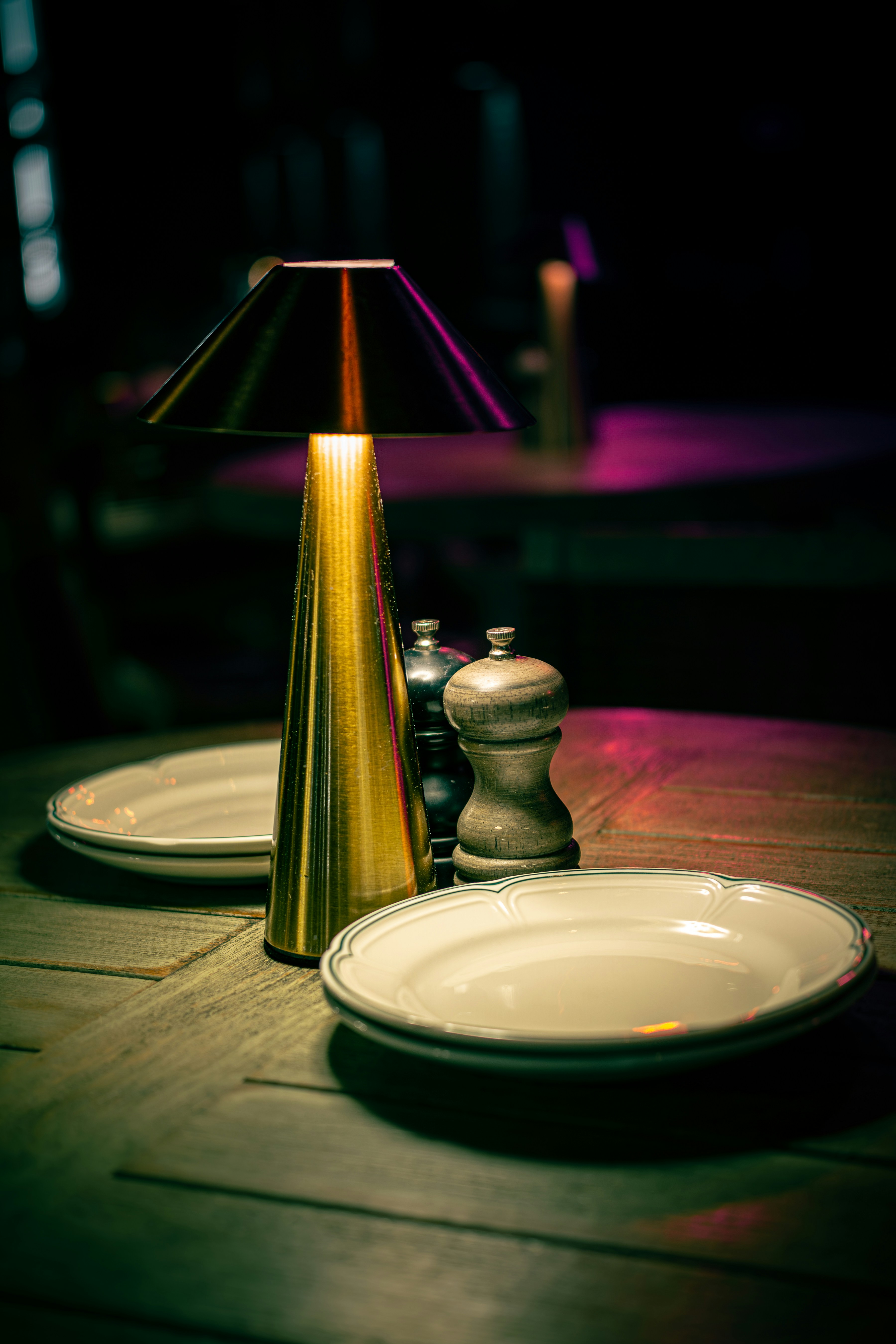 Neon-lit Tabletop: A Quiet Still Life with a Modern Lamp