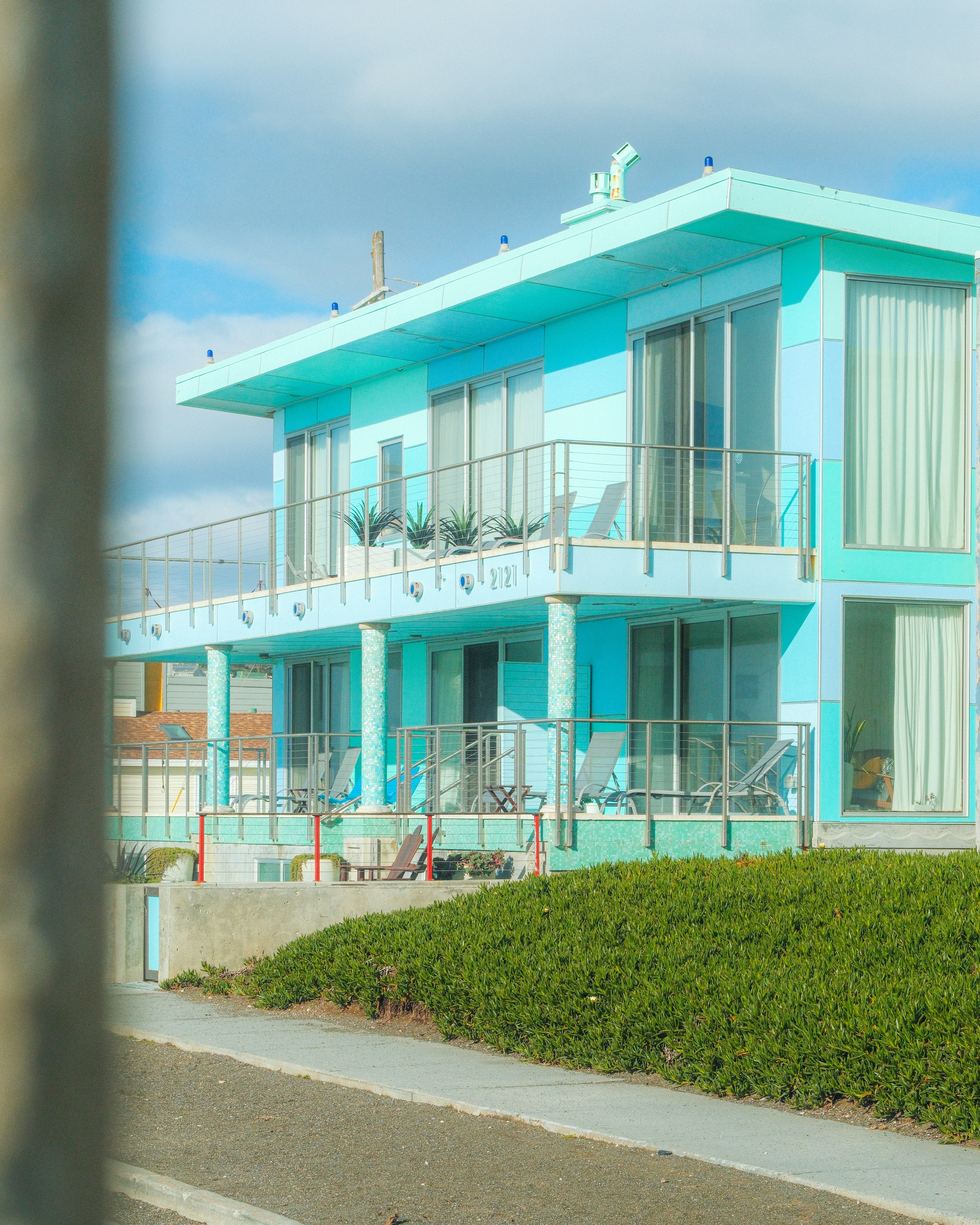 Turquoise Haven: A coastal villa with sunlit balconies