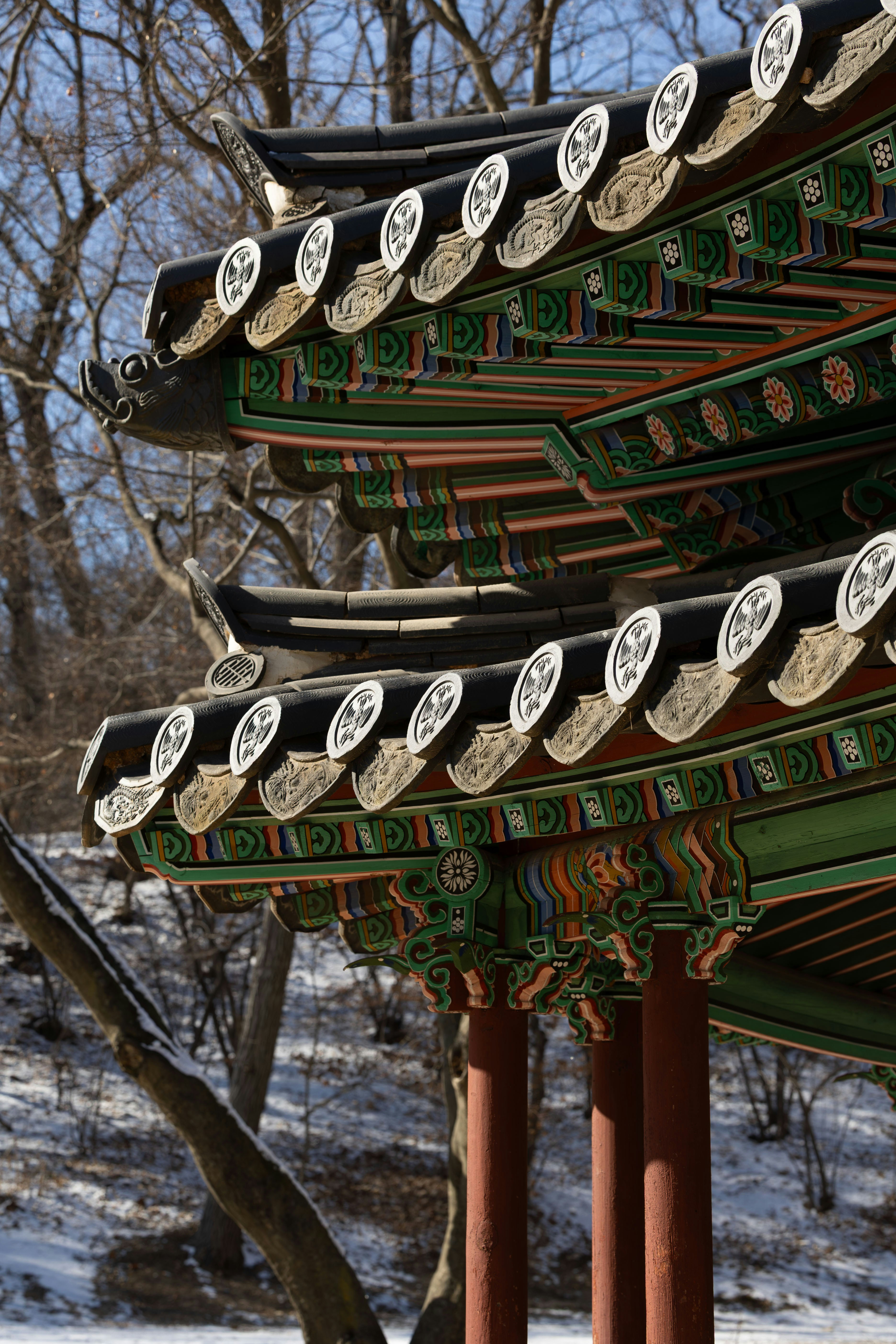 Cornered Eaves: A Close-Up of Colorful Traditional Roof Ornaments
