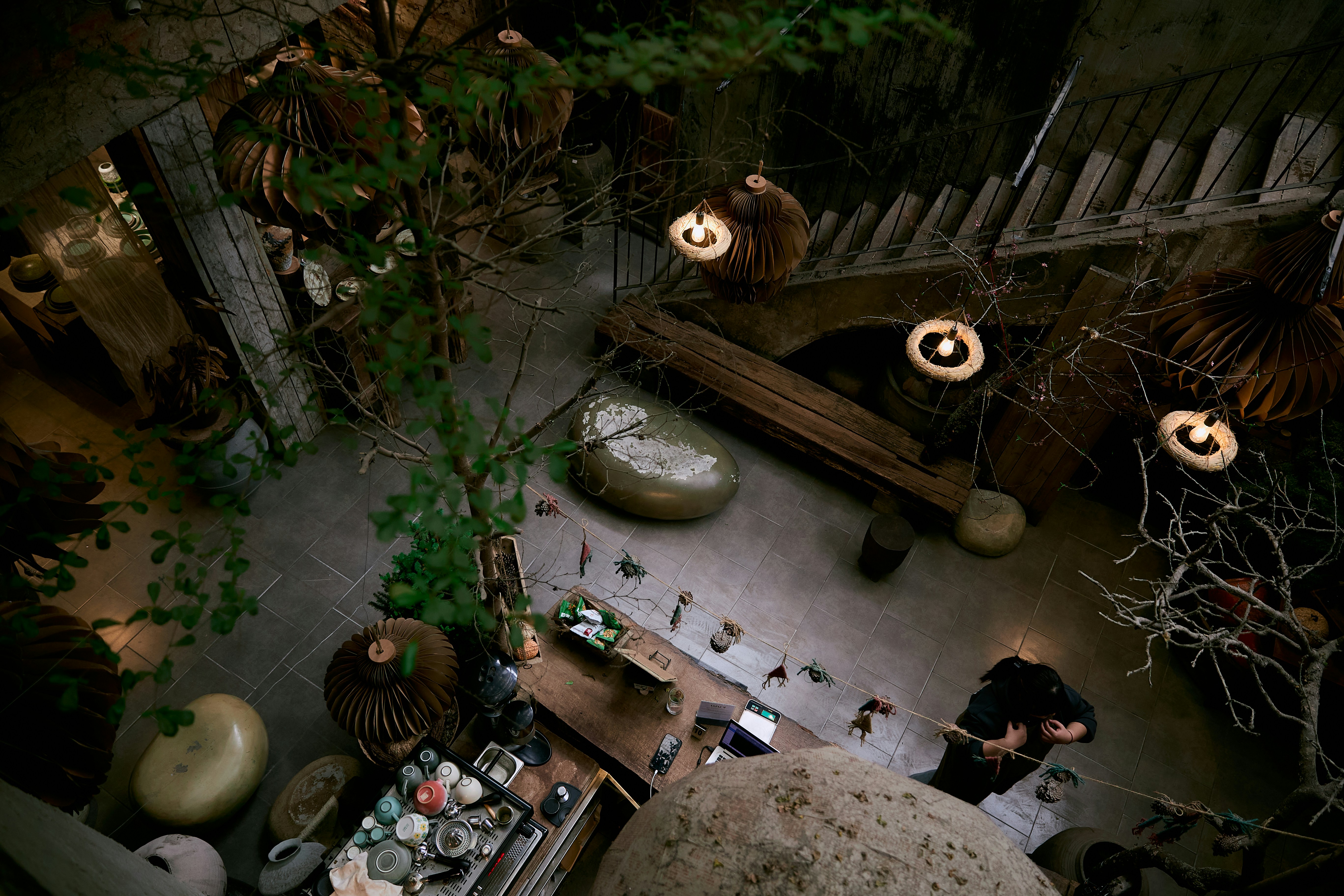 Aerial Atrium: Calm in a Lantern-lit Café Courtyard