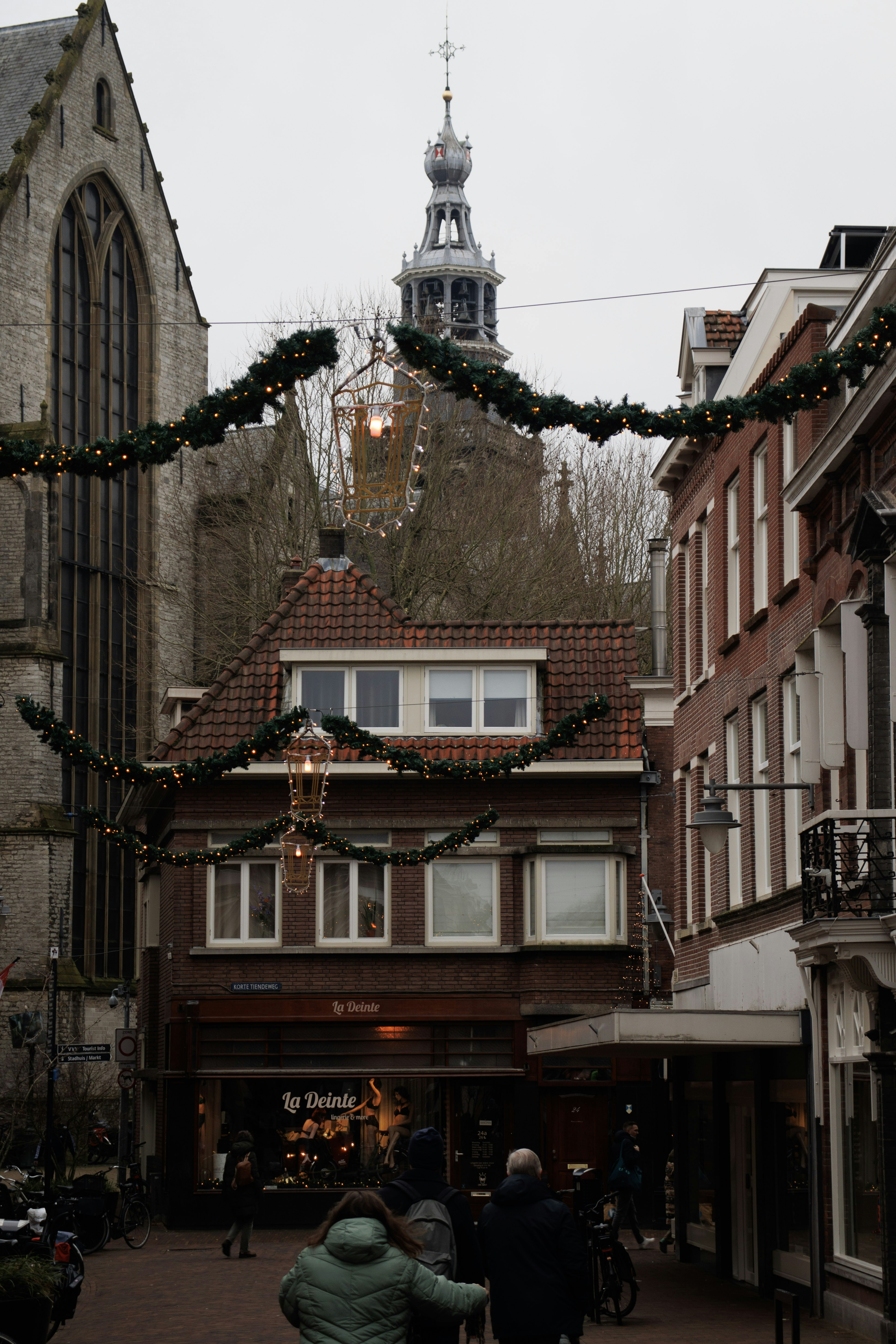 Festive Street Lanterns: A Quiet Winter Evening Beneath a Historic Clock Tower