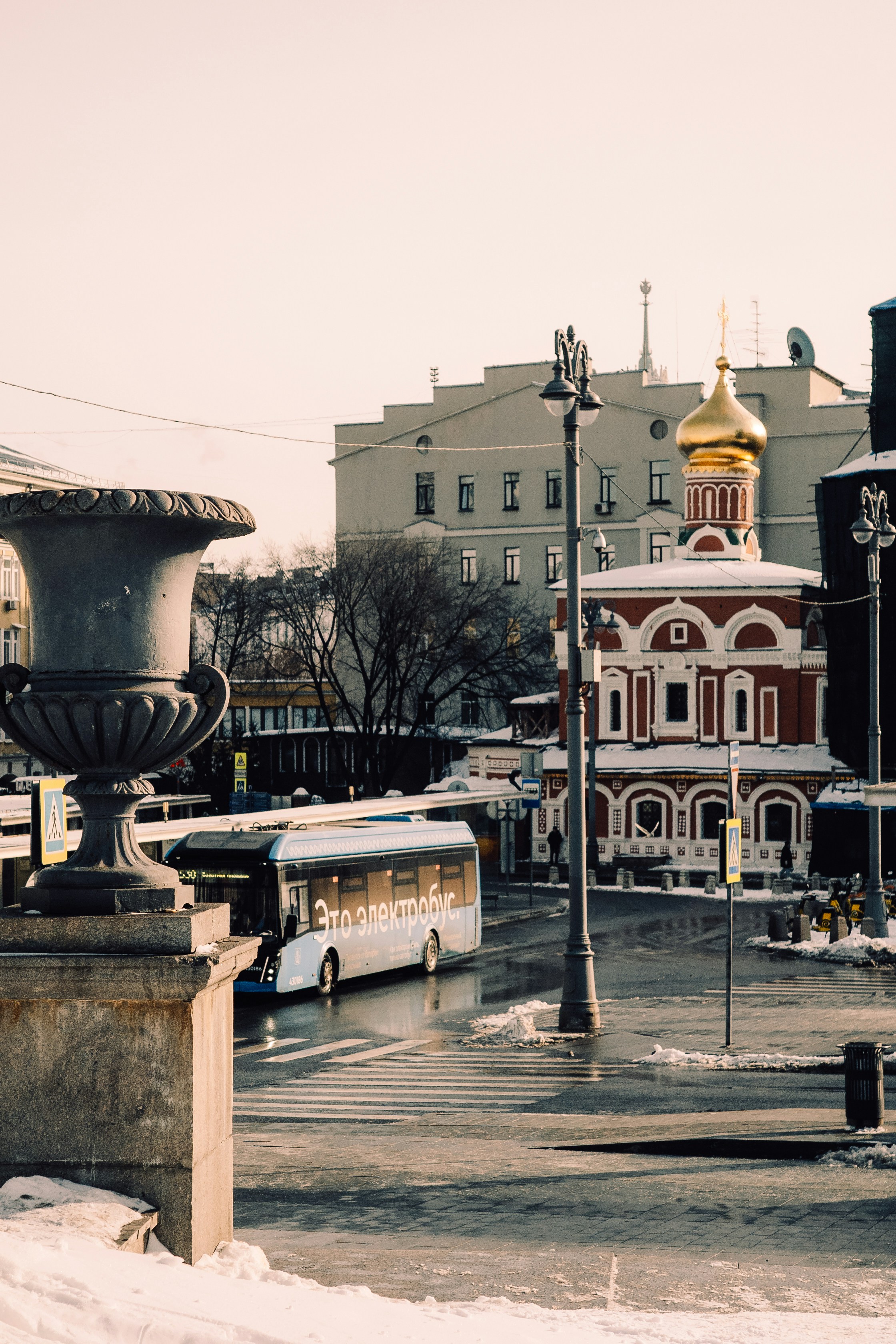 Golden Dome and Streetcar Quietly Framed in Winter