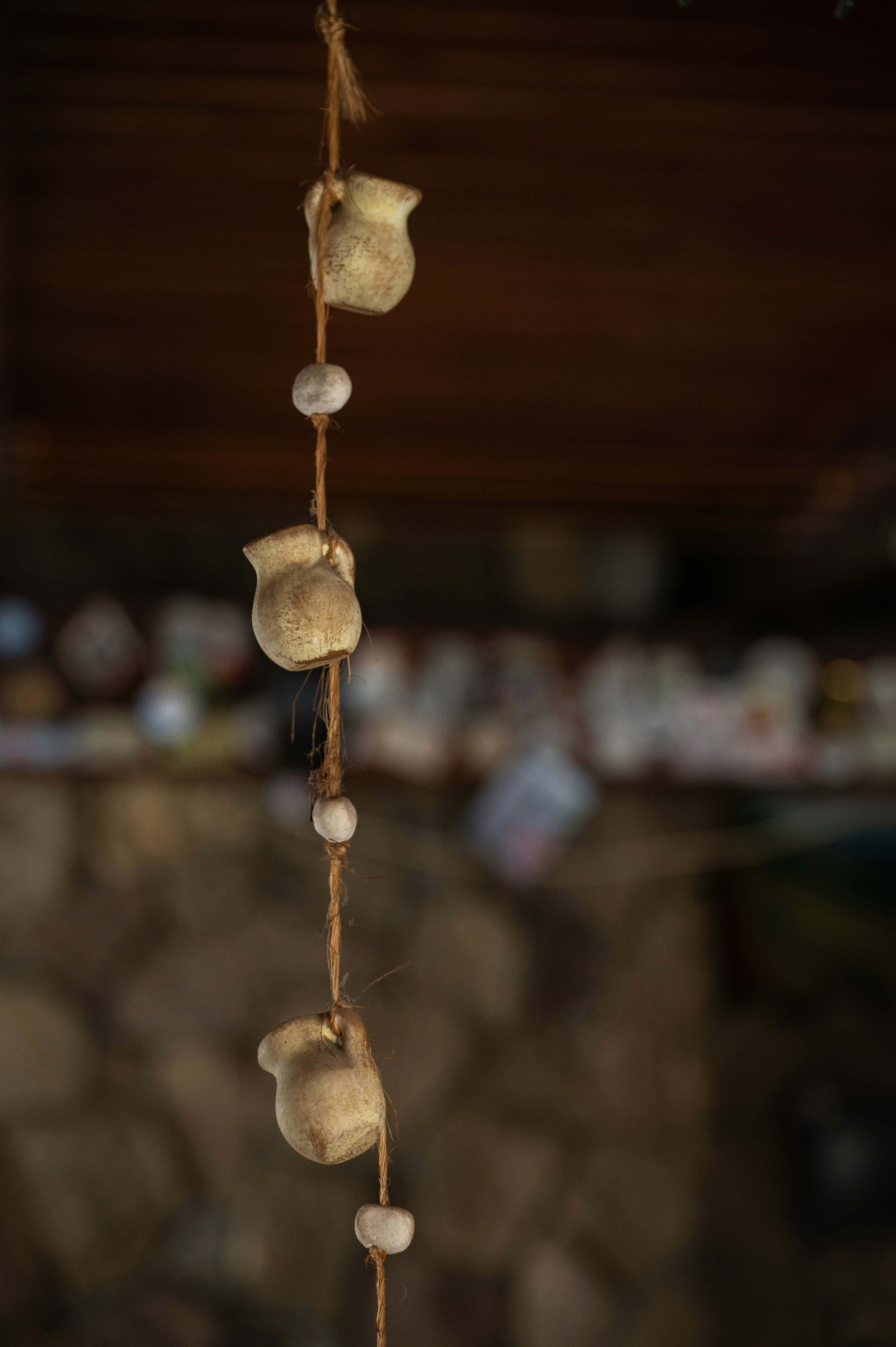 Hanging Light Core: A String of Pebbles in a Dim Workshop