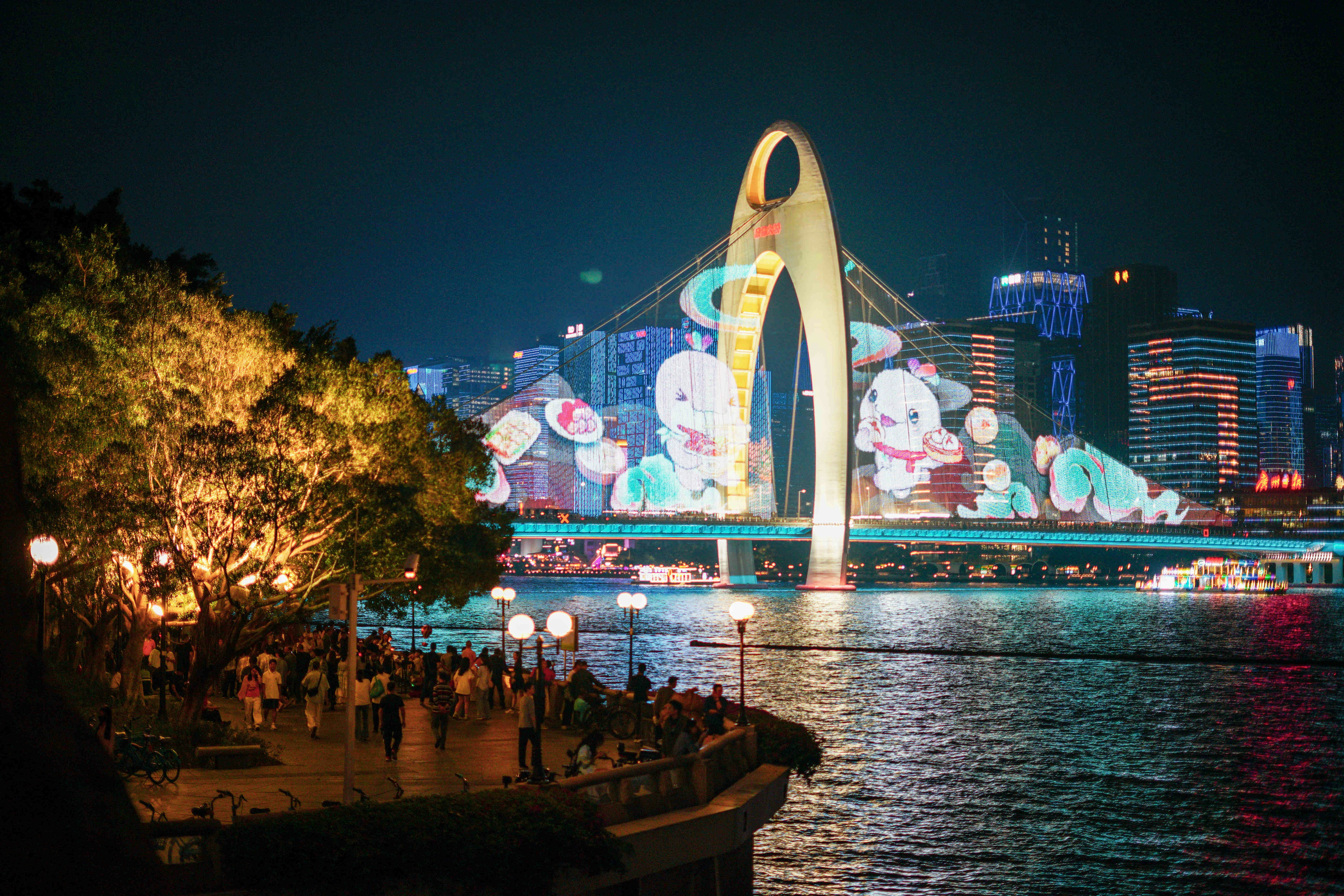 Neon Arch Over the River: A Night at the Guangzhou Zhujiang Bridge Scene